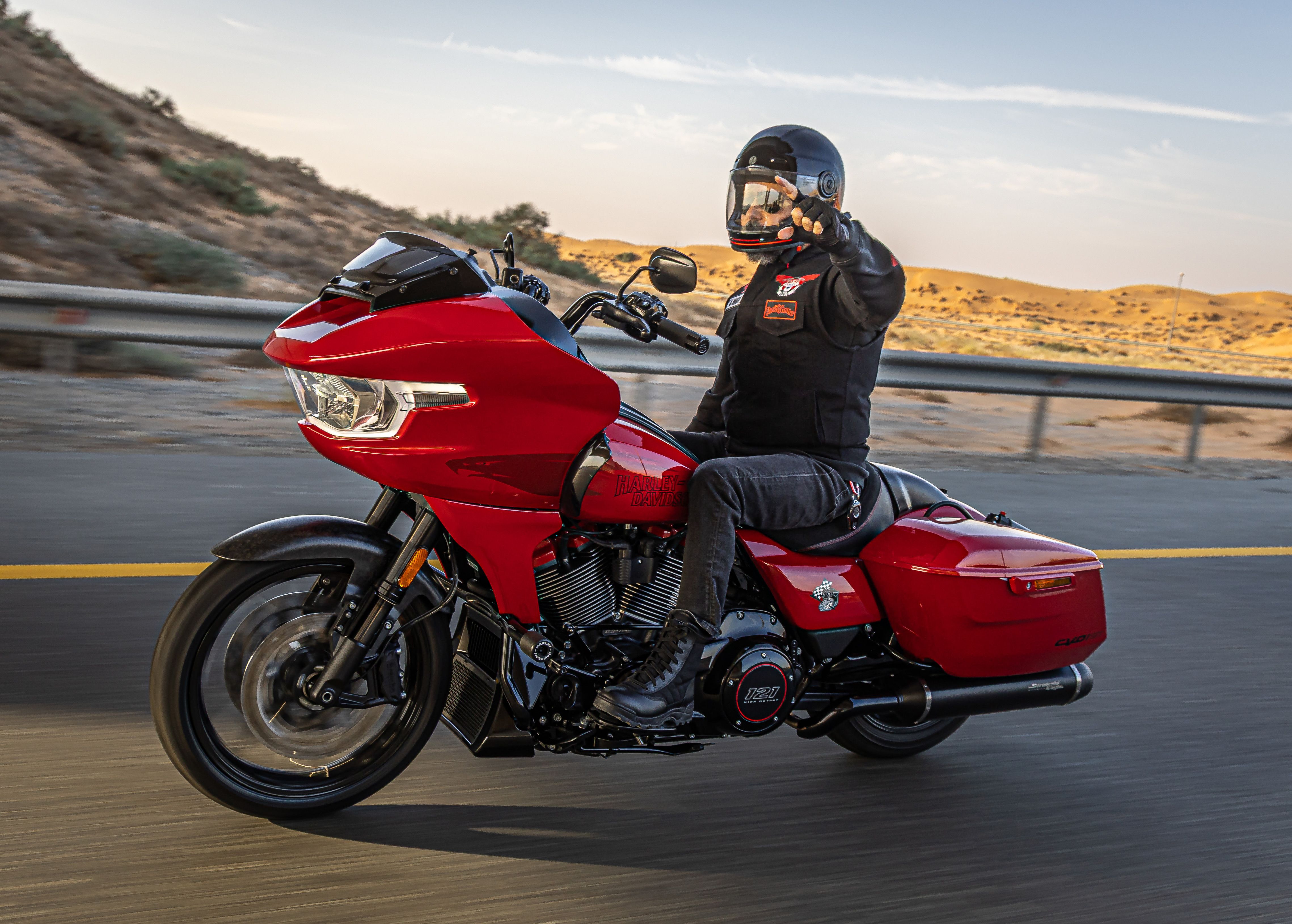 Motorcyclist Riding Red Bike on Desert Highway · Free Stock Photo