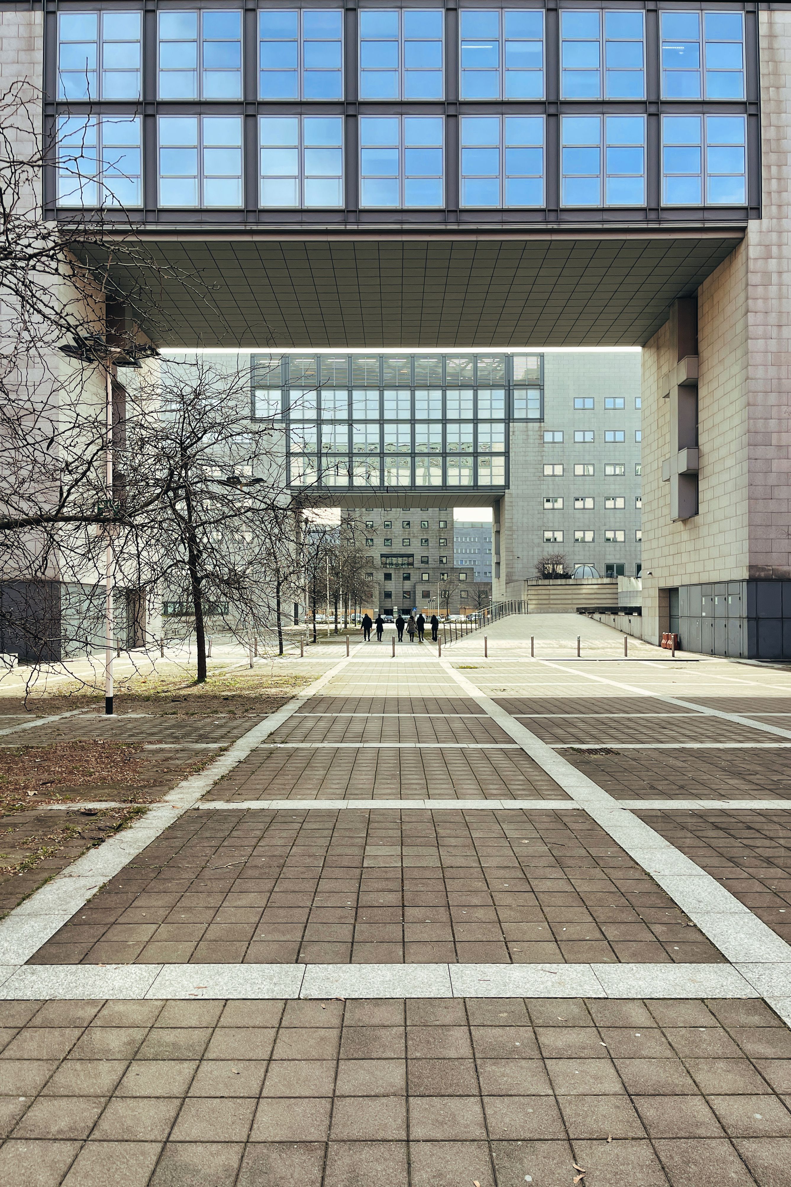 Modern Architectural Walkway with Geometric Design · Free Stock Photo