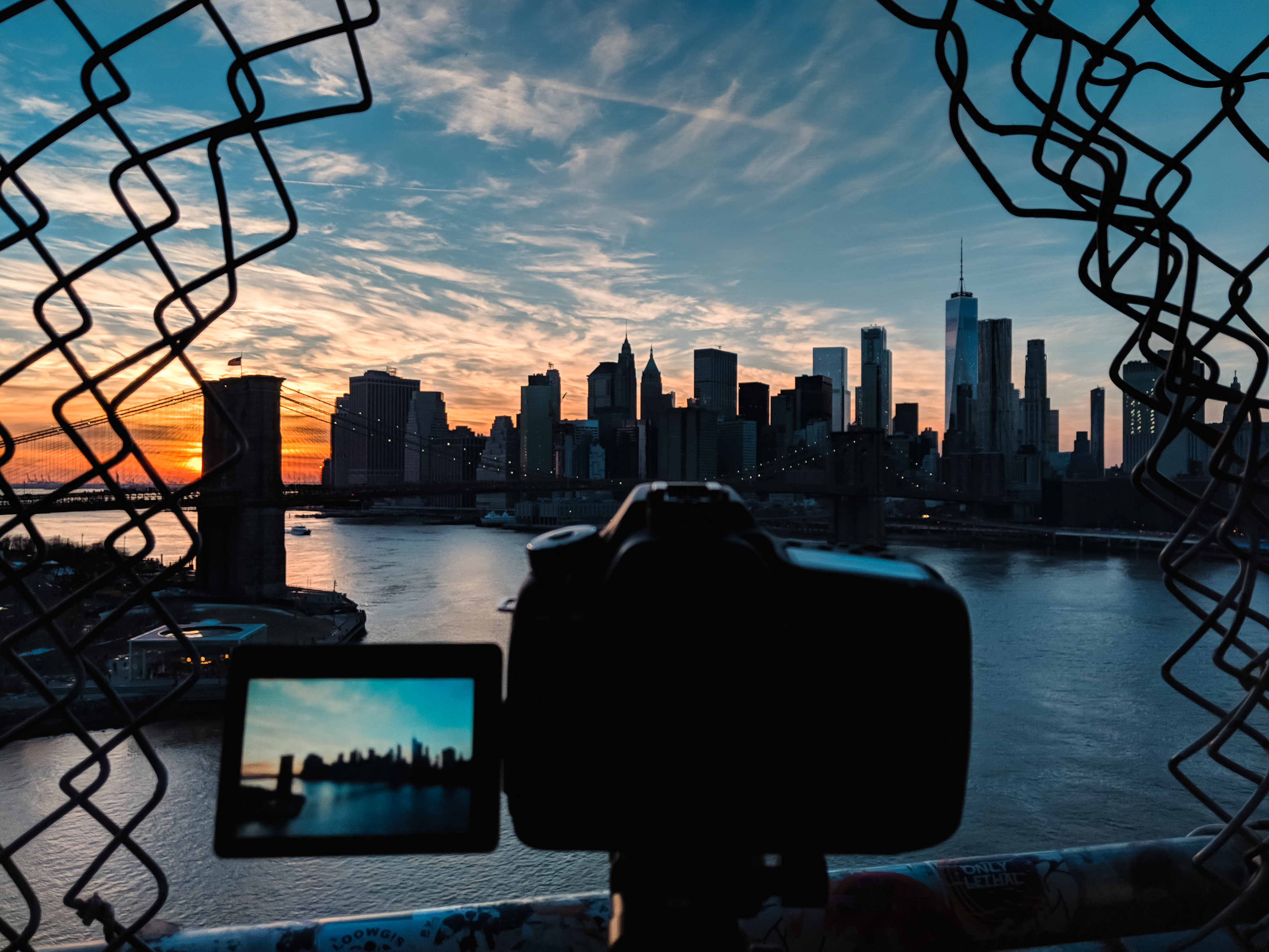 New York City Skyline at Sunset Through Camera Lens · Free Stock Photo
