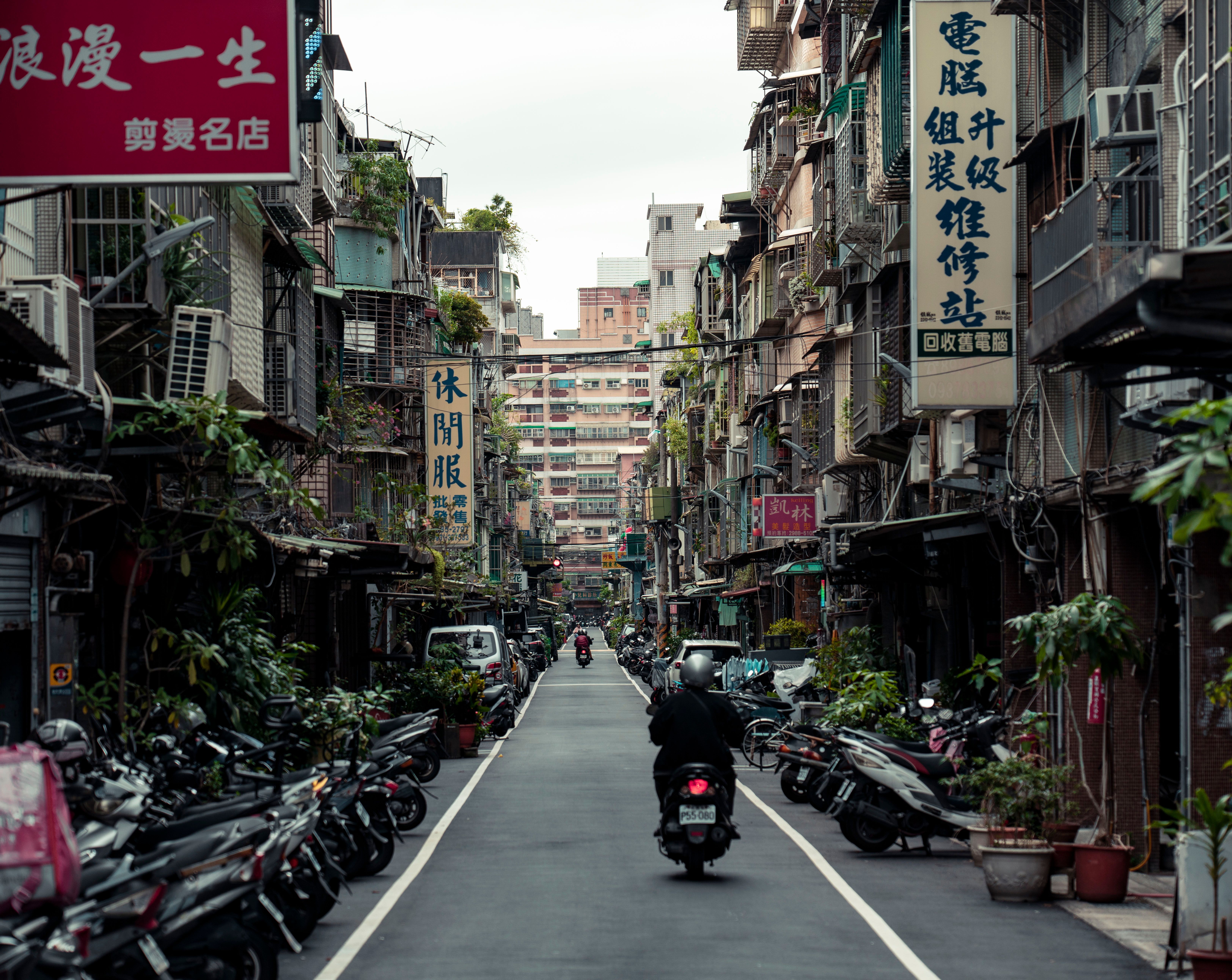 Busy Taipei Street with Motorcycles and Urban Architecture · Free Stock ...