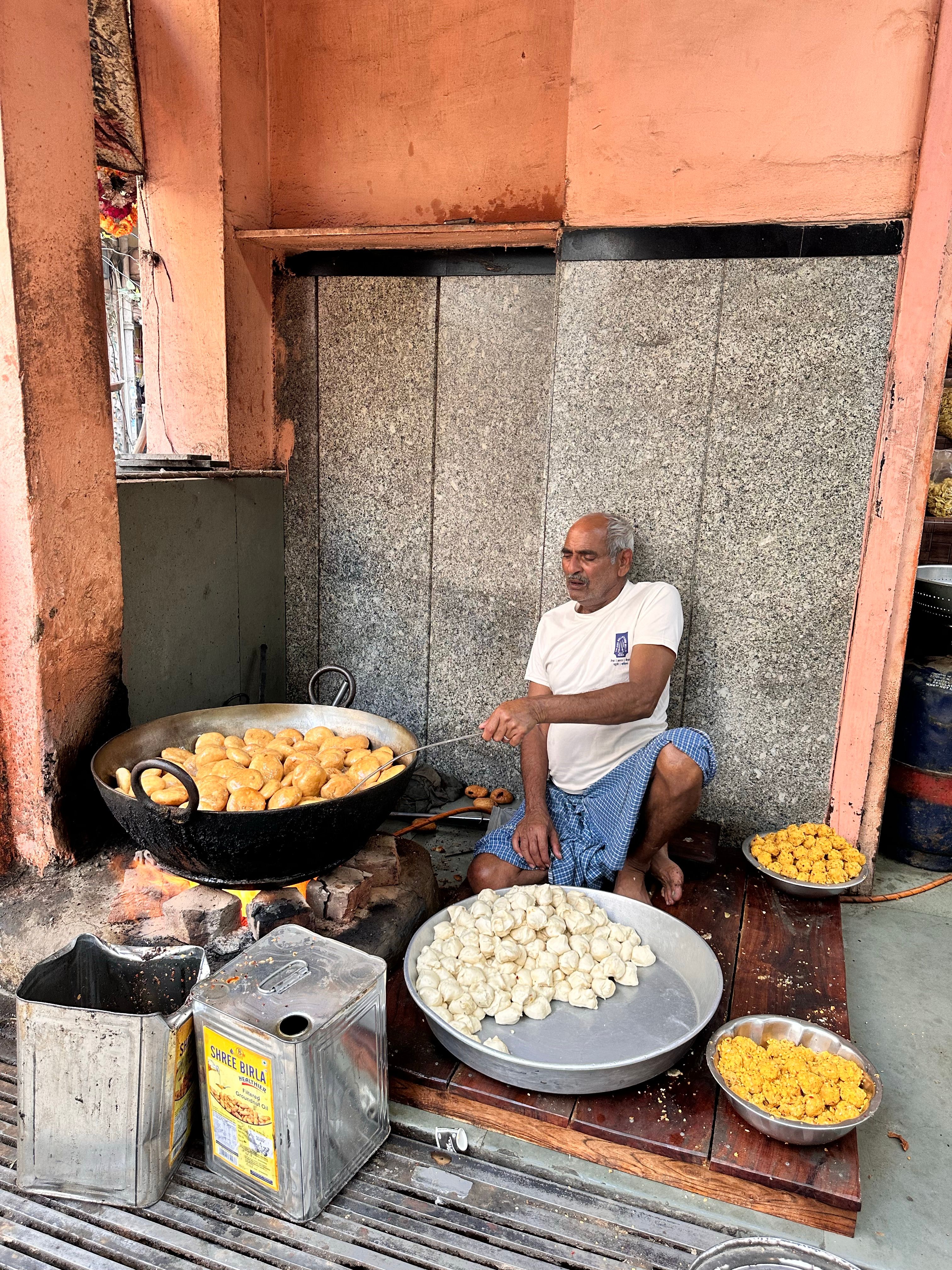 Street Vendor Cooking Indian Sweets Outdoors · Free Stock Photo