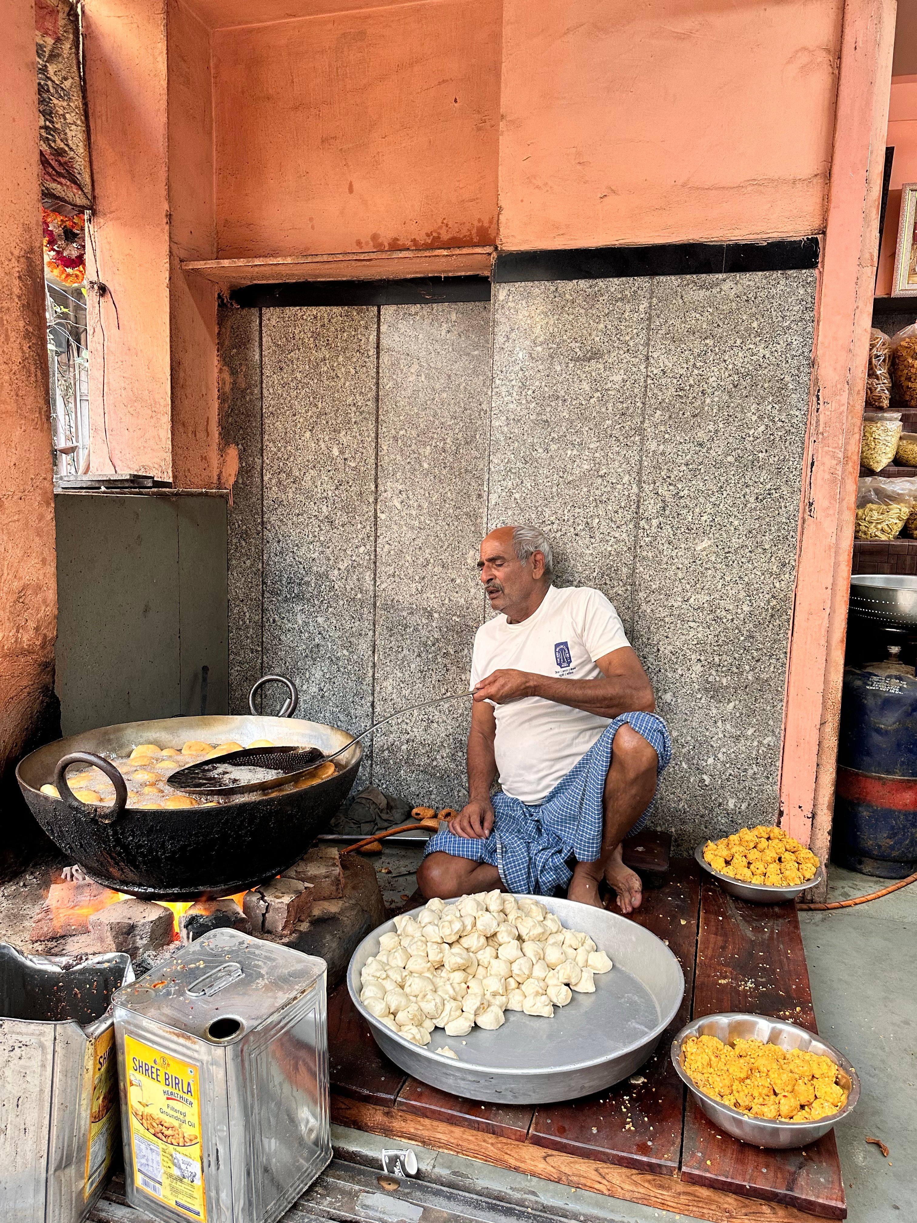 Street Food Vendor Cooking Traditional Indian Snacks · Free Stock Photo