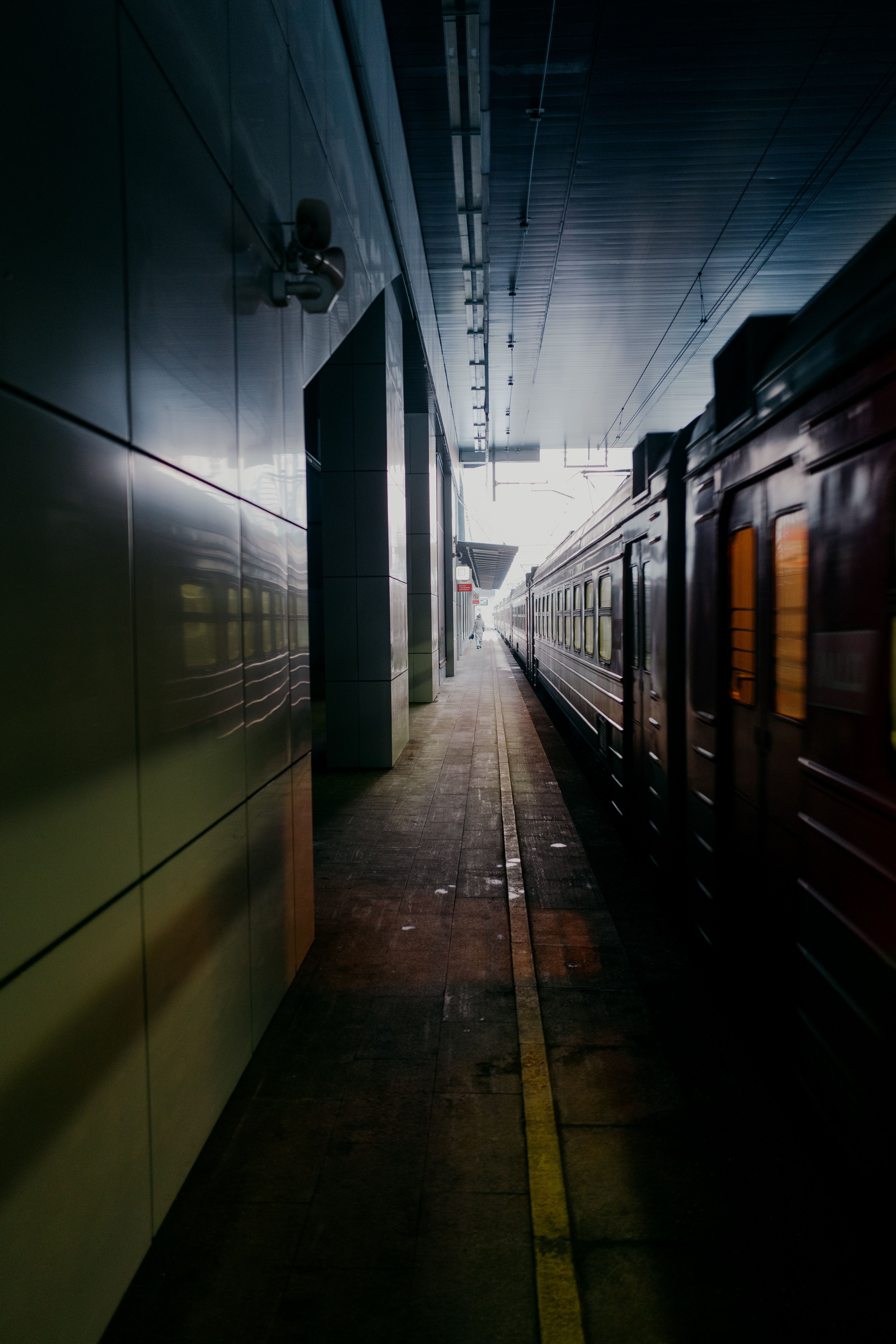 Moody Train Station Platform with Red Train · Free Stock Photo