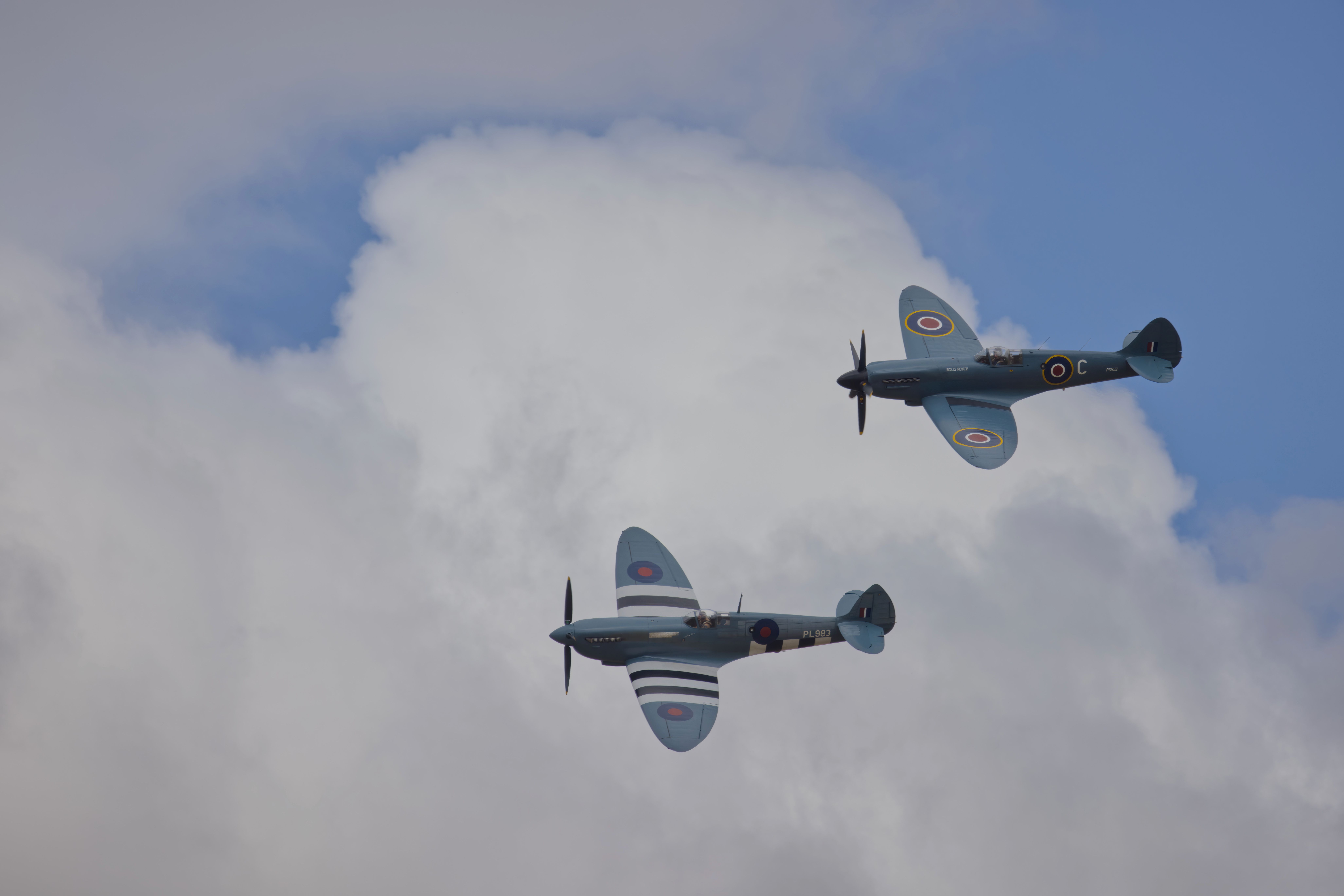 Vintage Spitfire Planes in Mid-Air Display · Free Stock Photo