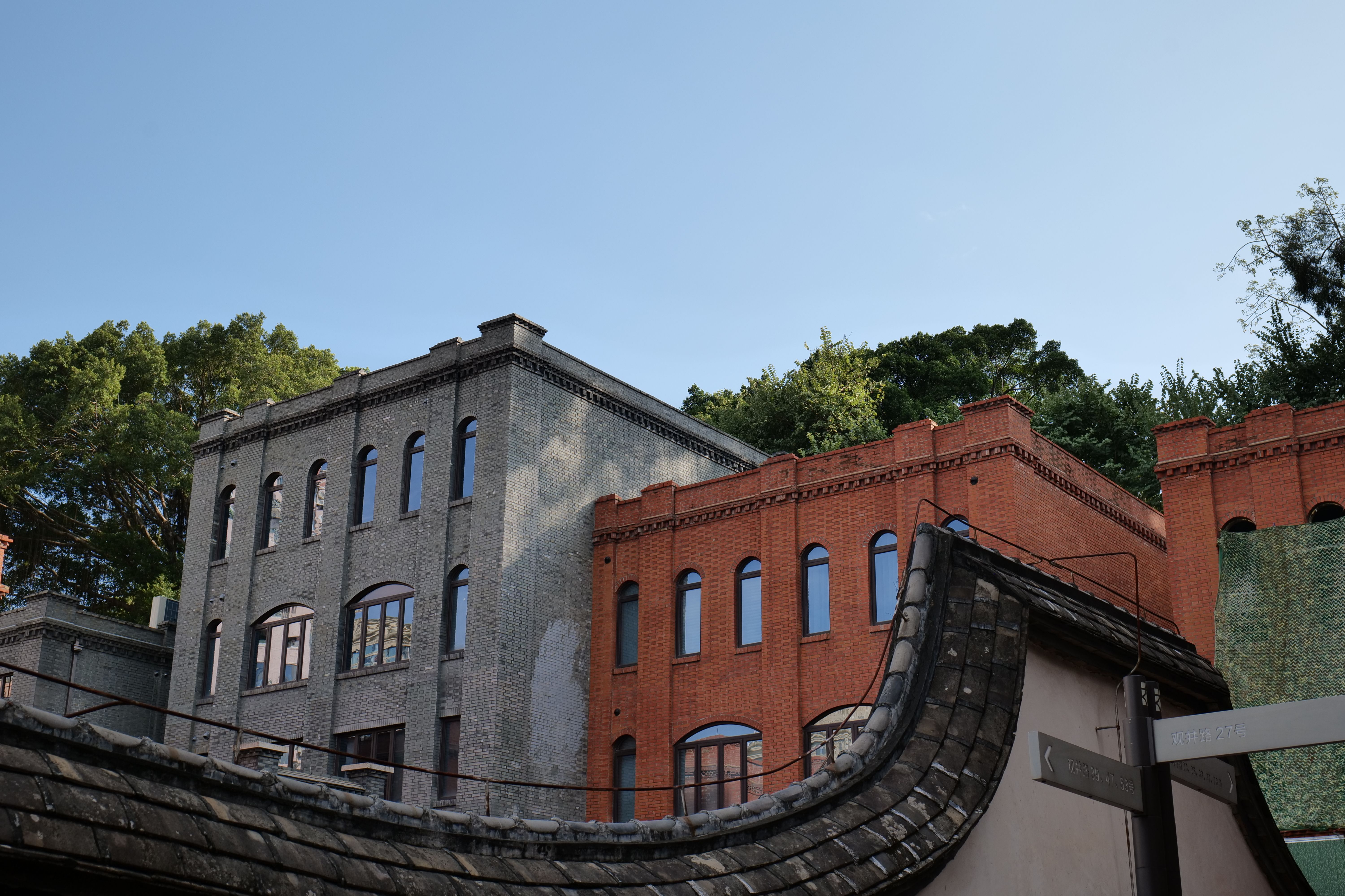Historical Brick Buildings in Urban Setting · Free Stock Photo