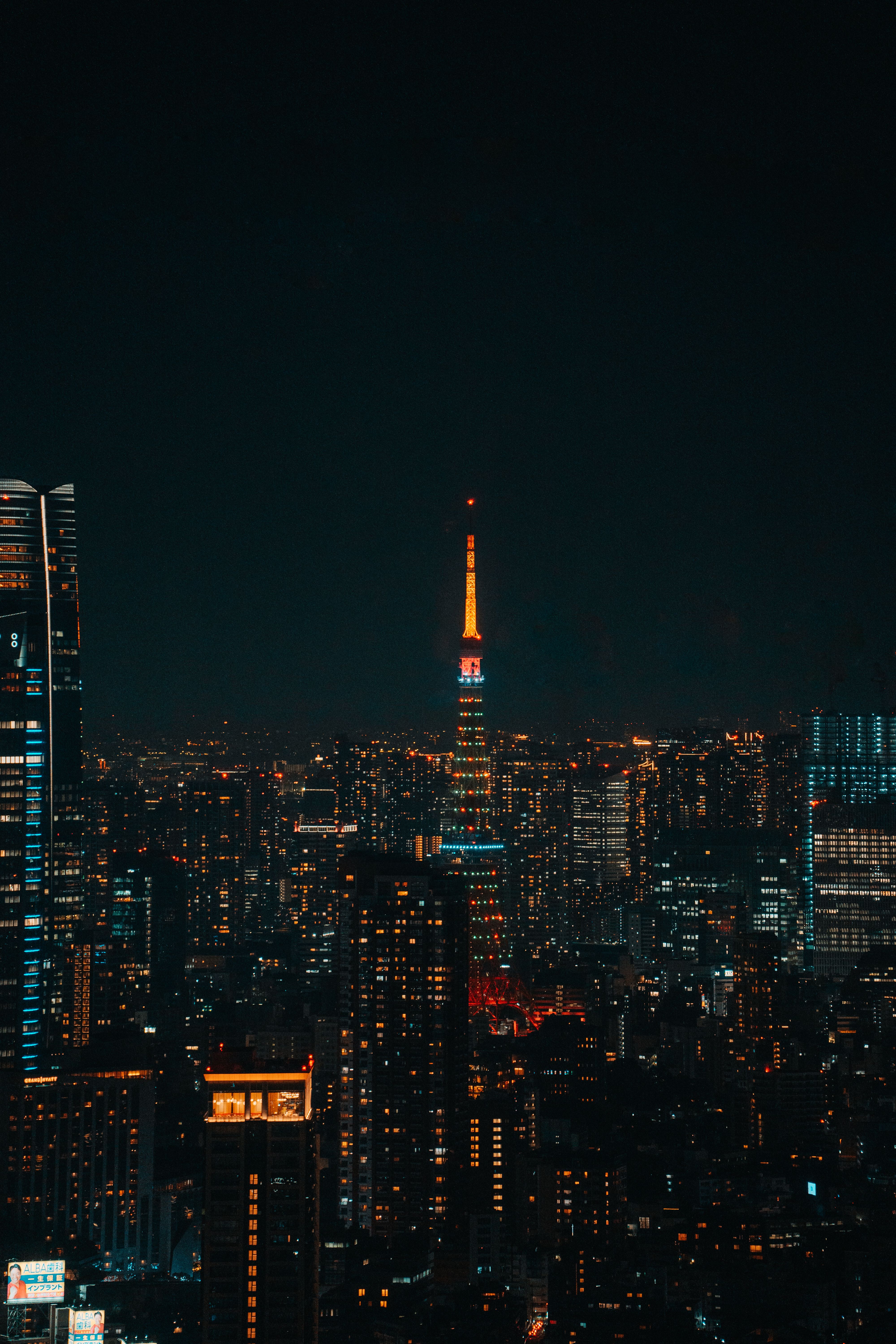 Tokyo Skyline at Night with Tokyo Tower Illuminated · Free Stock Photo