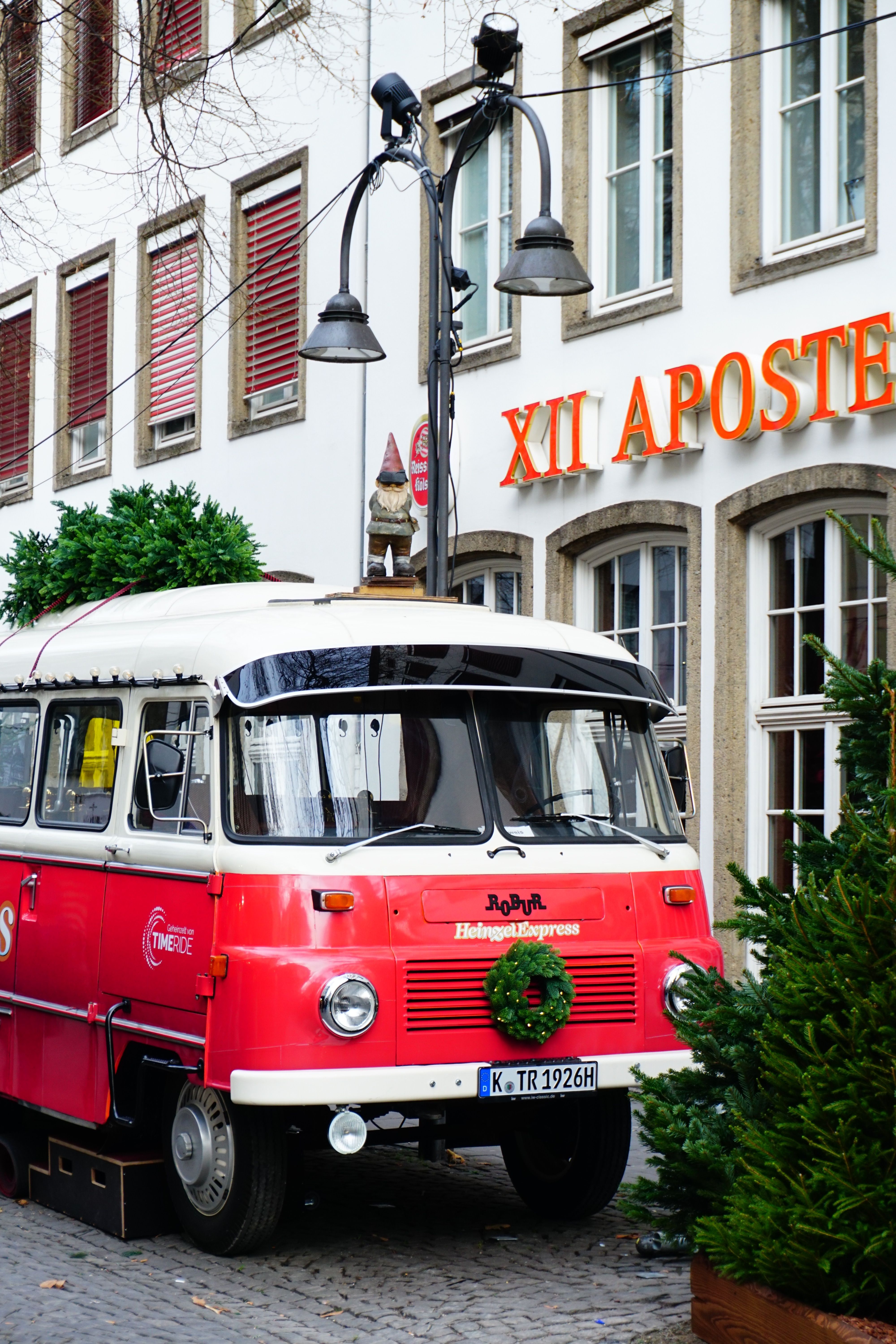 Vintage Red Bus in European City Street · Free Stock Photo