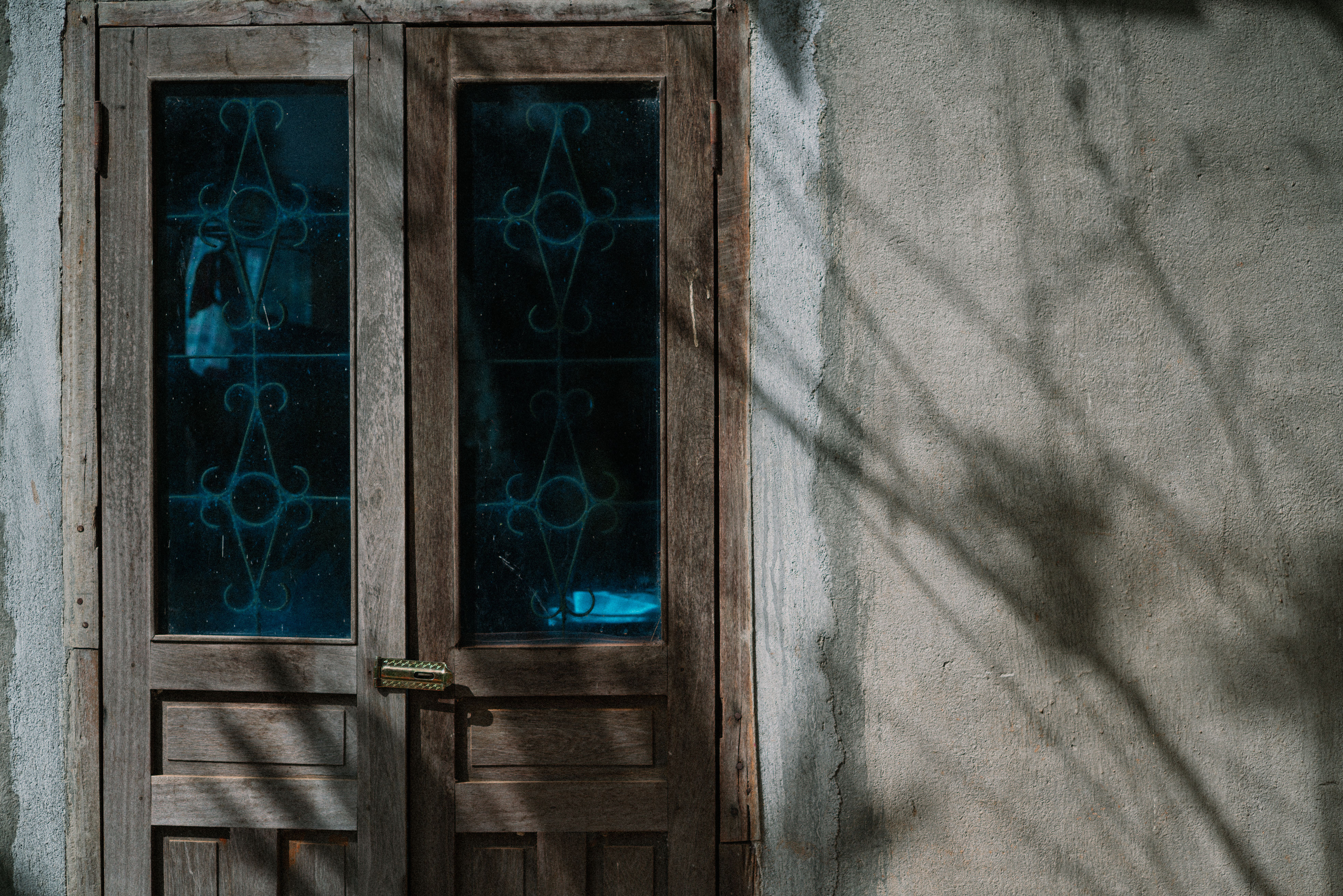 Wooden Door with Decorative Glass and Shadows · Free Stock Photo