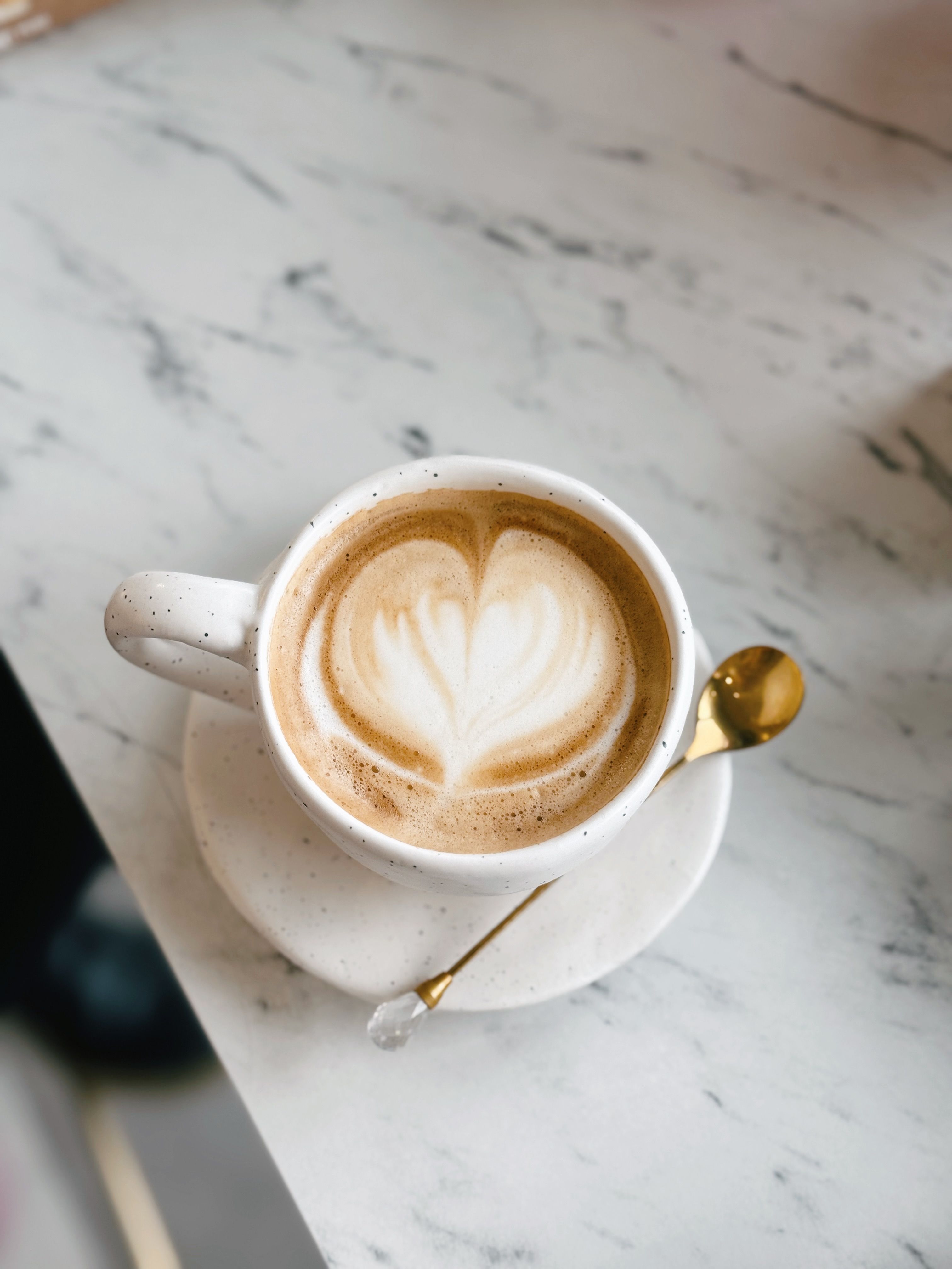 Artistic Latte with Heart Design on Marble Table · Free Stock Photo