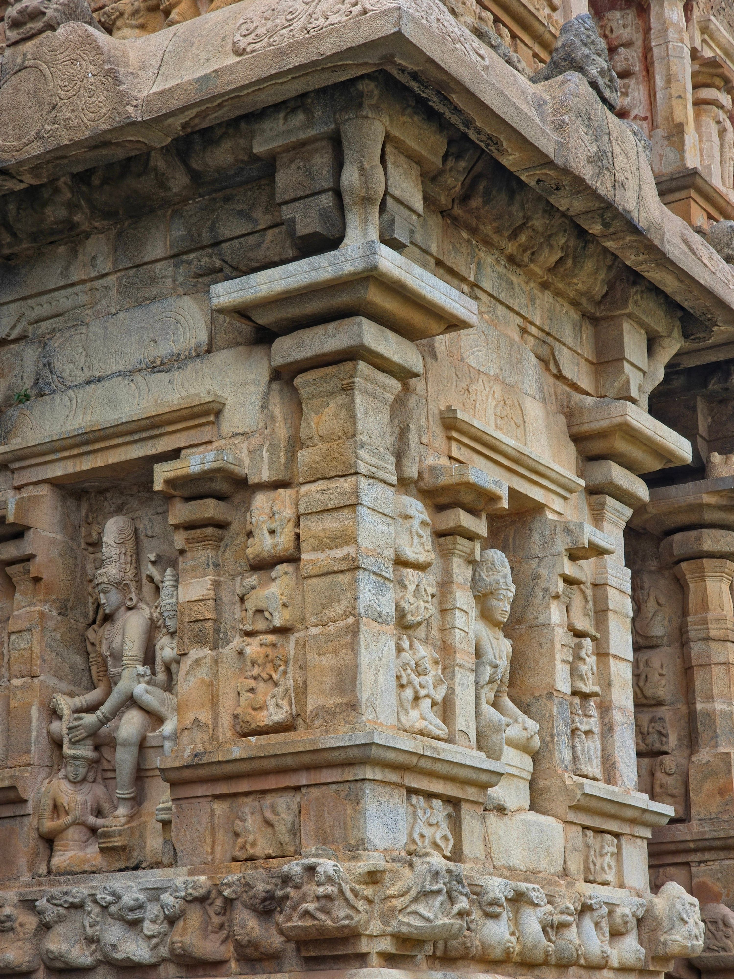 Intricate Stone Carvings on Ancient Temple Wall · Free Stock Photo