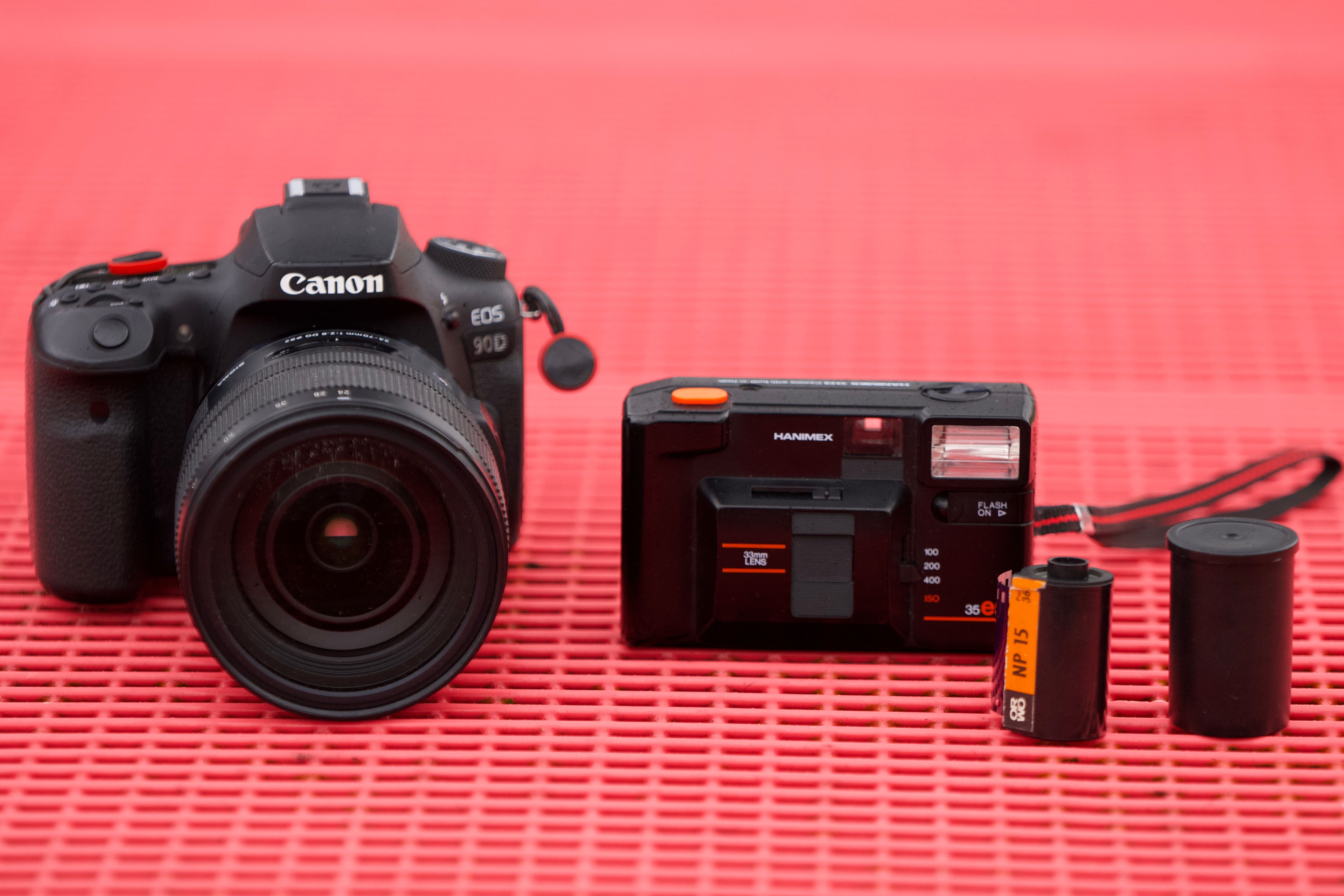 Analog and Digital Cameras on Red Surface · Free Stock Photo