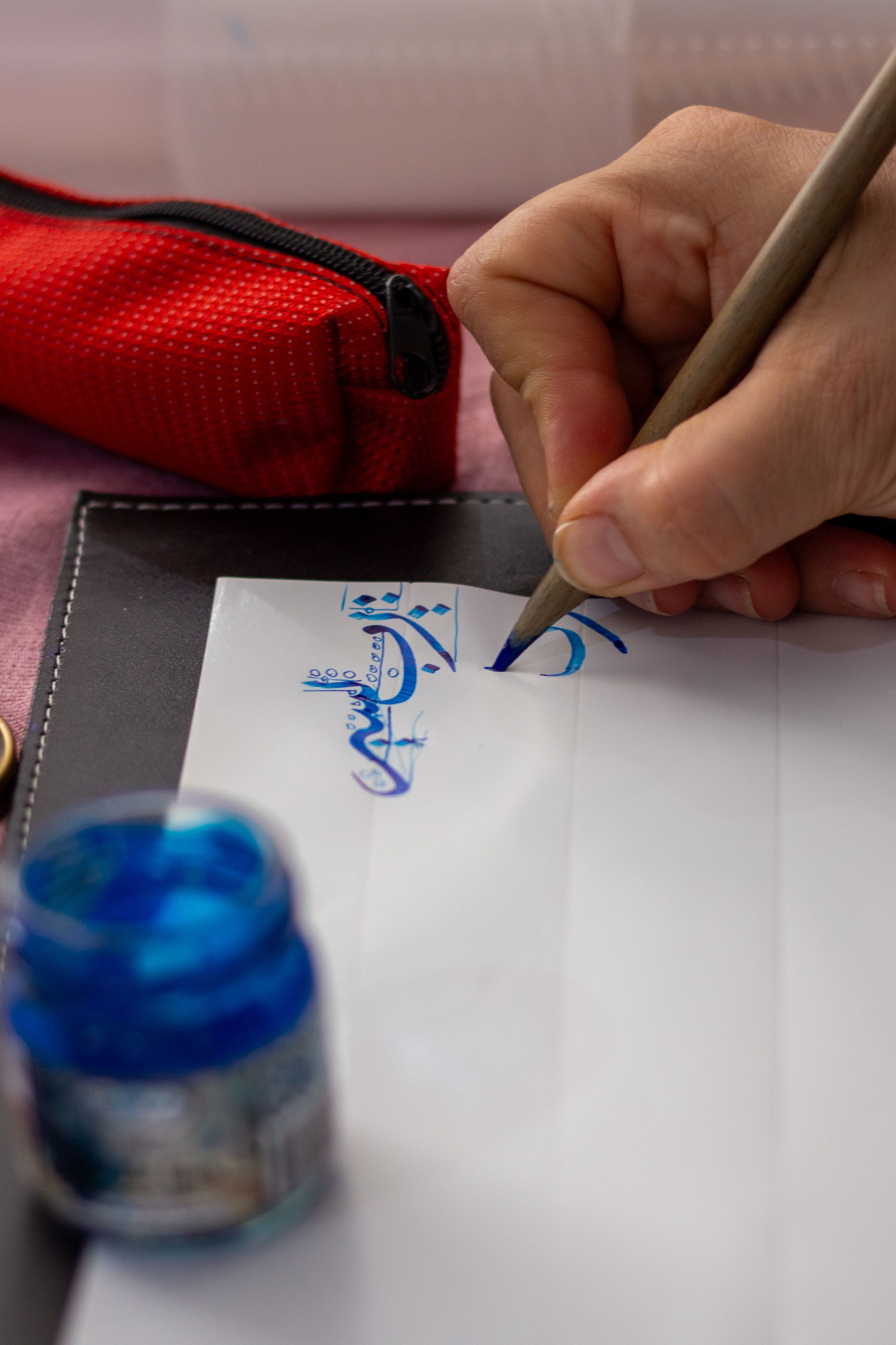 Handwriting with Calligraphy Pen and Ink · Free Stock Photo