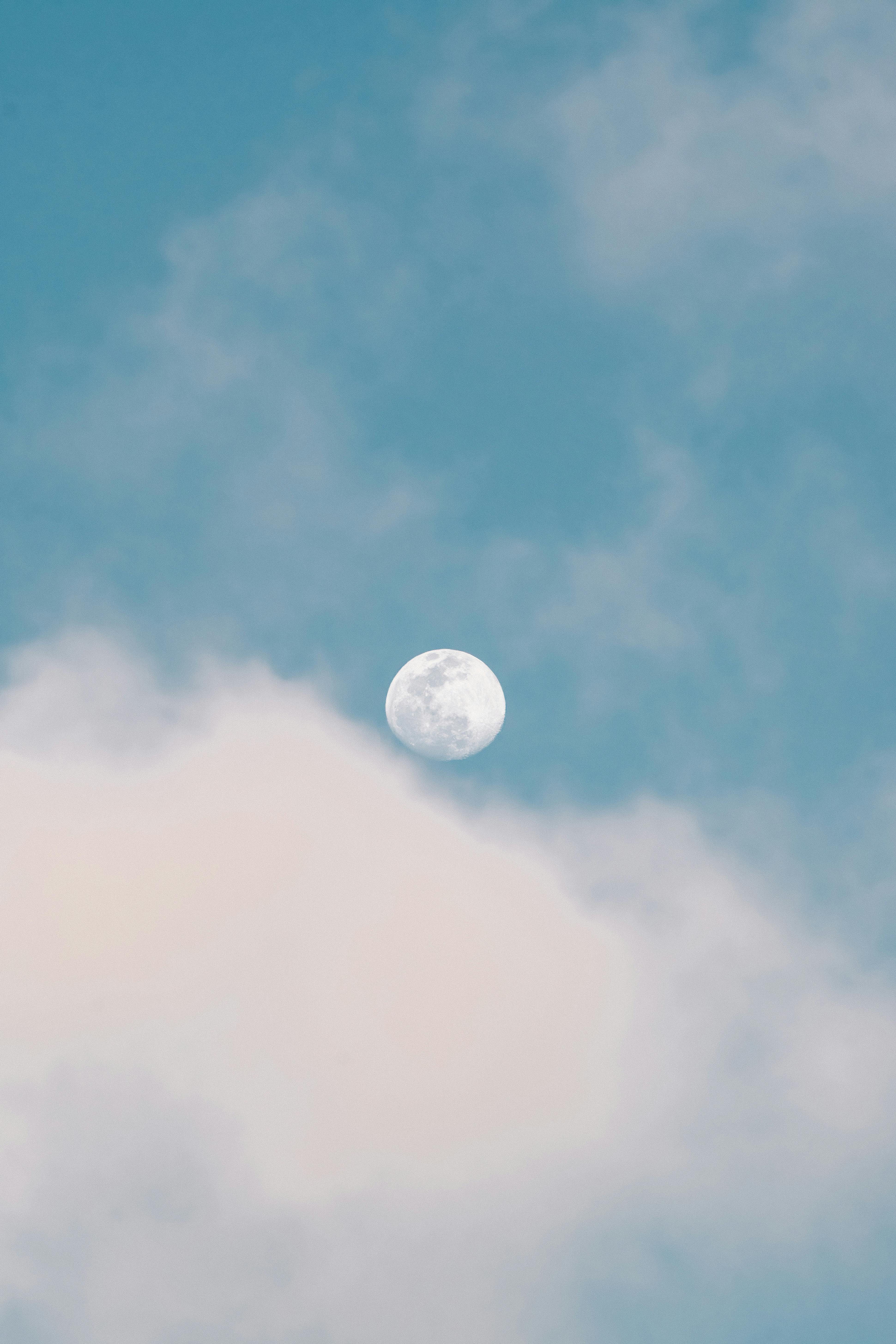 Bright Moon in Daytime Sky with Clouds · Free Stock Photo