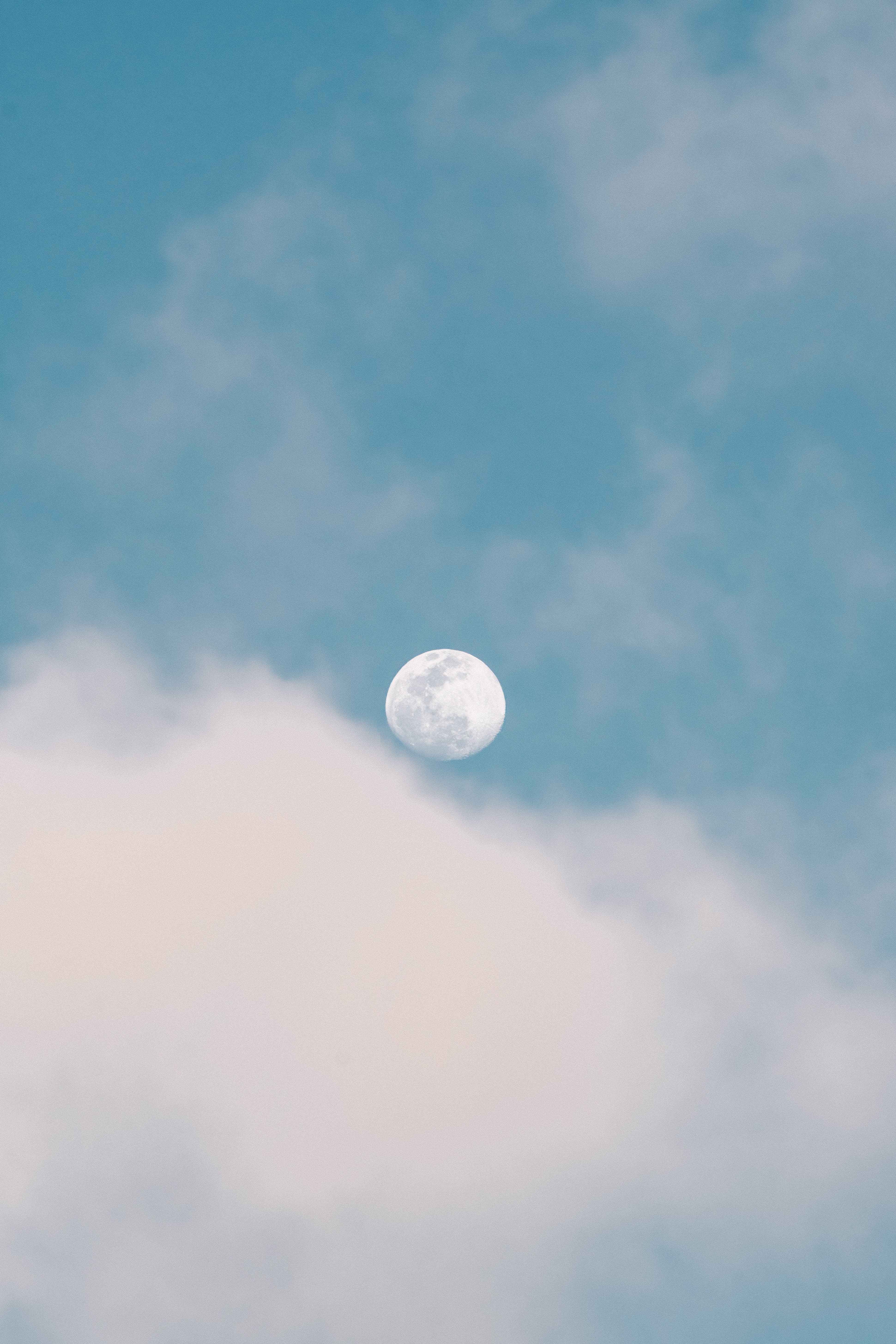 Bright Moon in Daytime Sky with Clouds · Free Stock Photo