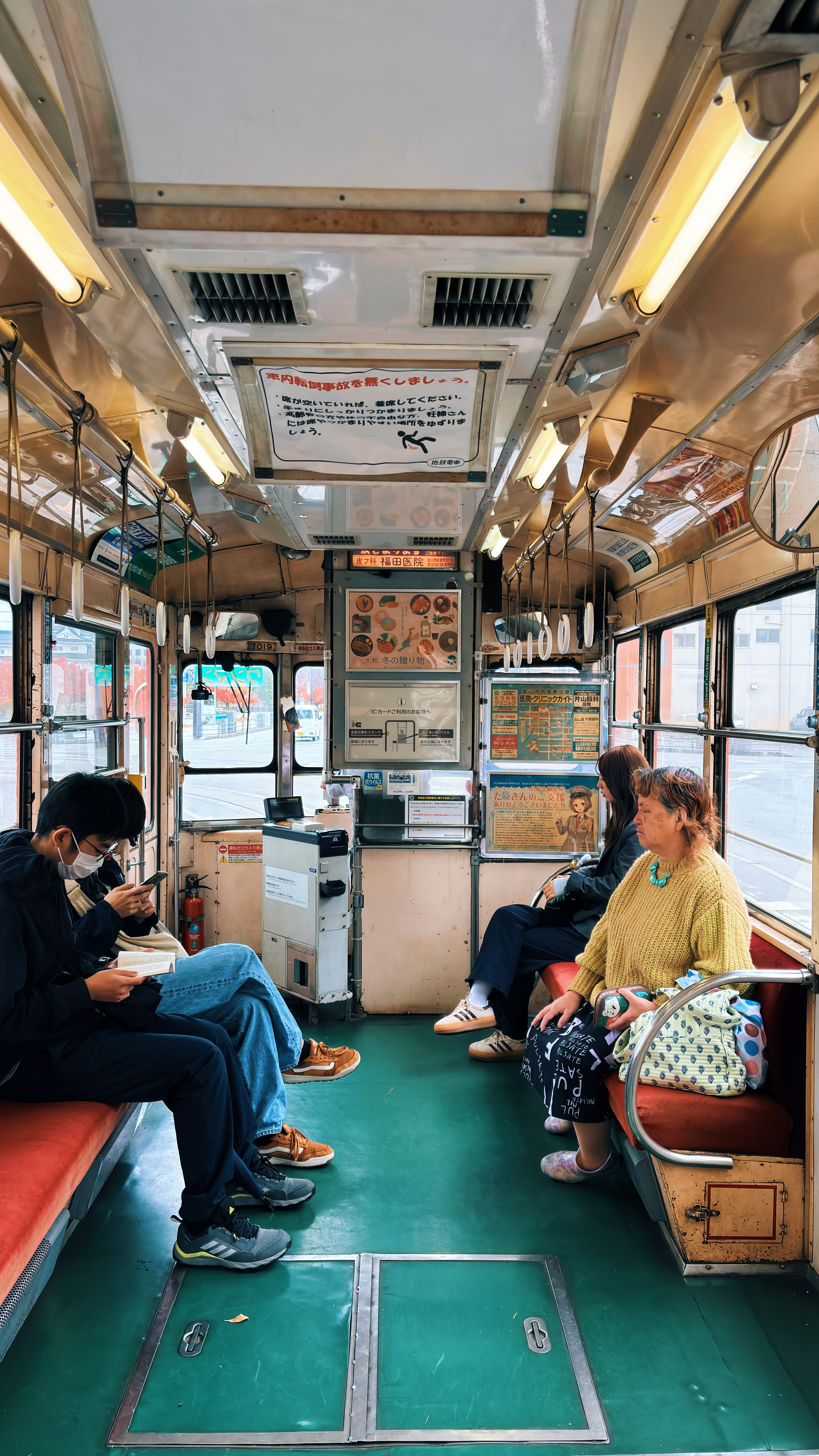 Interior of City Tram with Passengers · Free Stock Photo