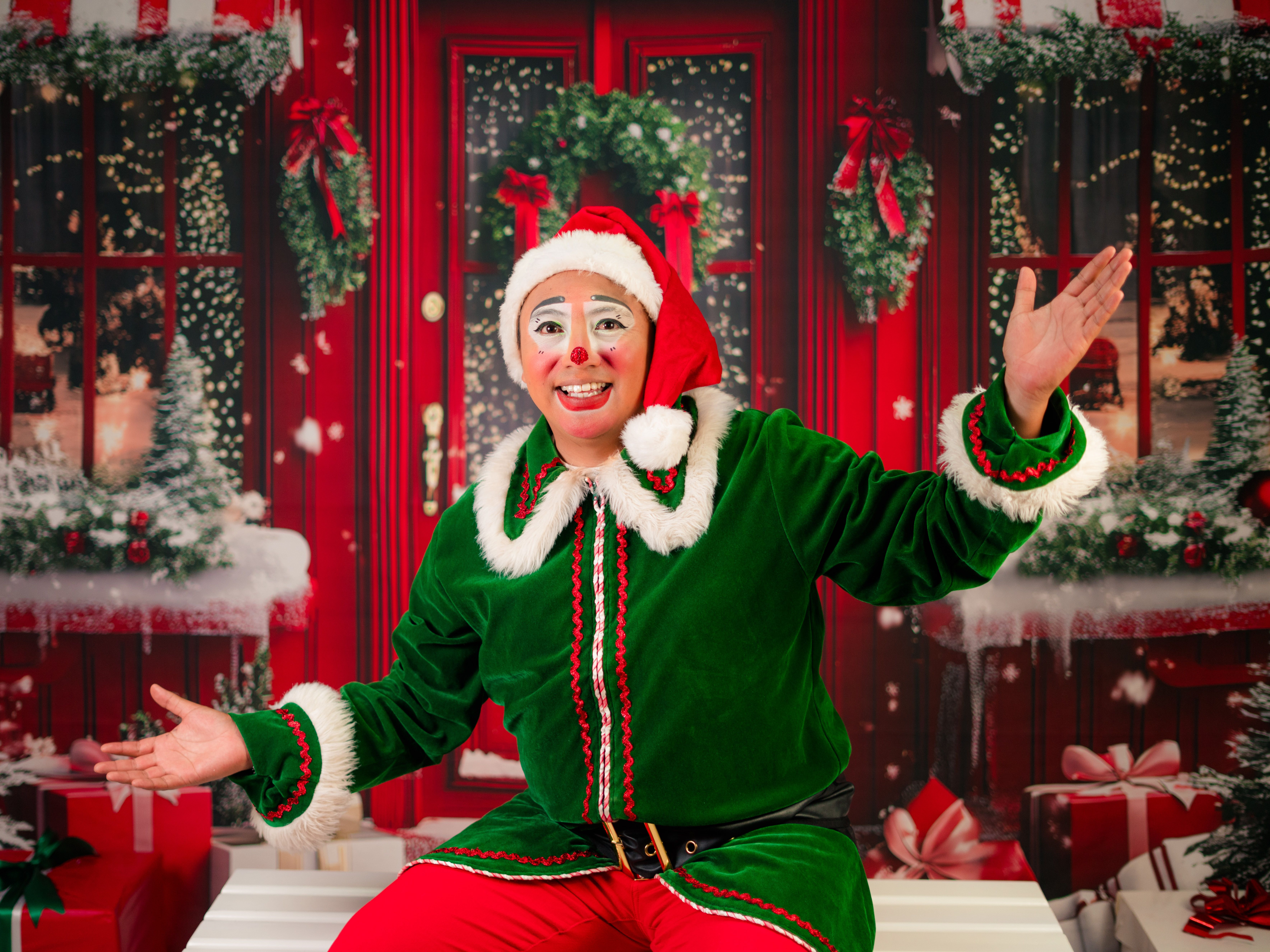 Festive Christmas Clown in Elf Costume · Free Stock Photo