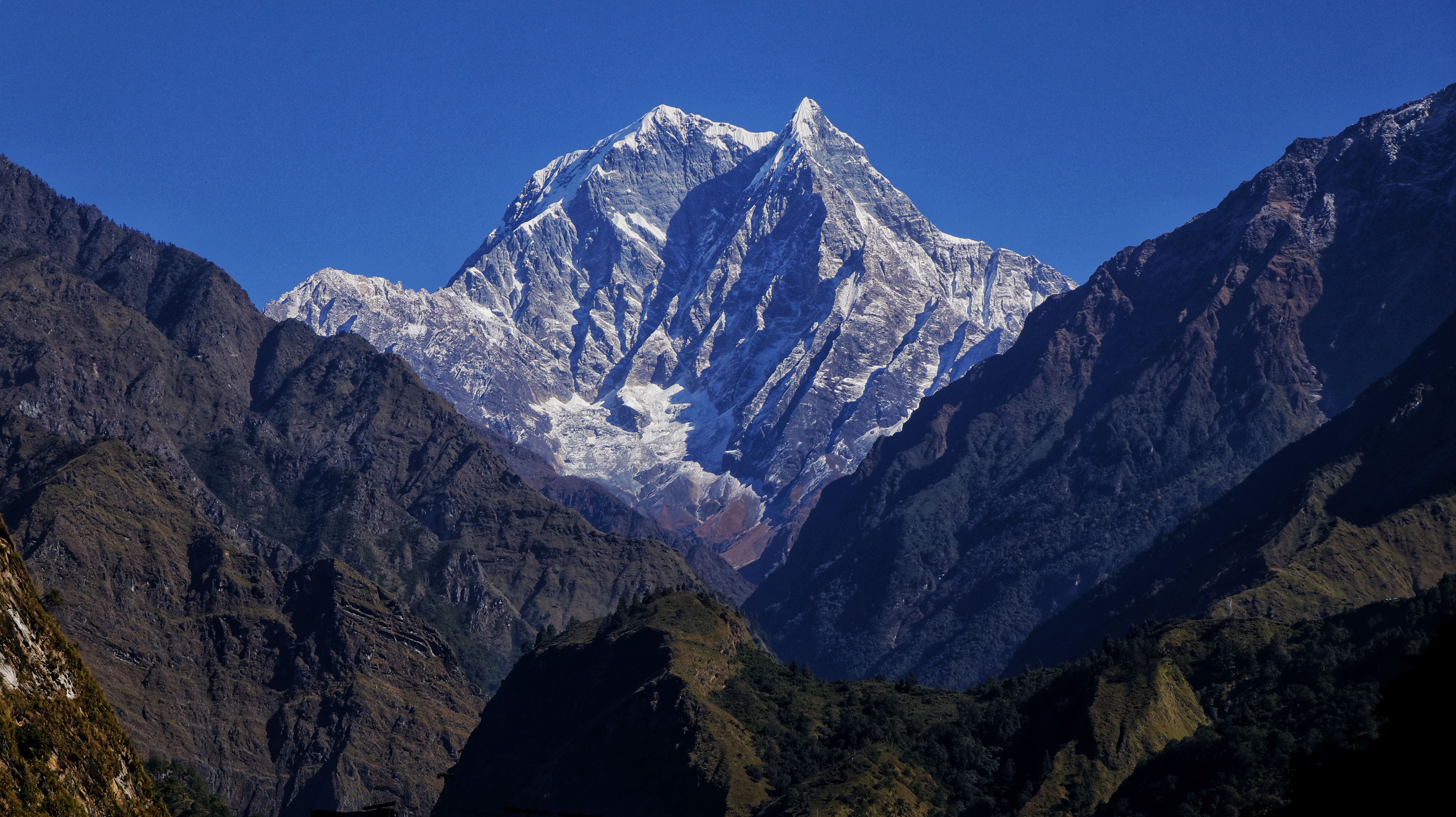 Majestic Himalayan Peak Under Blue Sky · Free Stock Photo