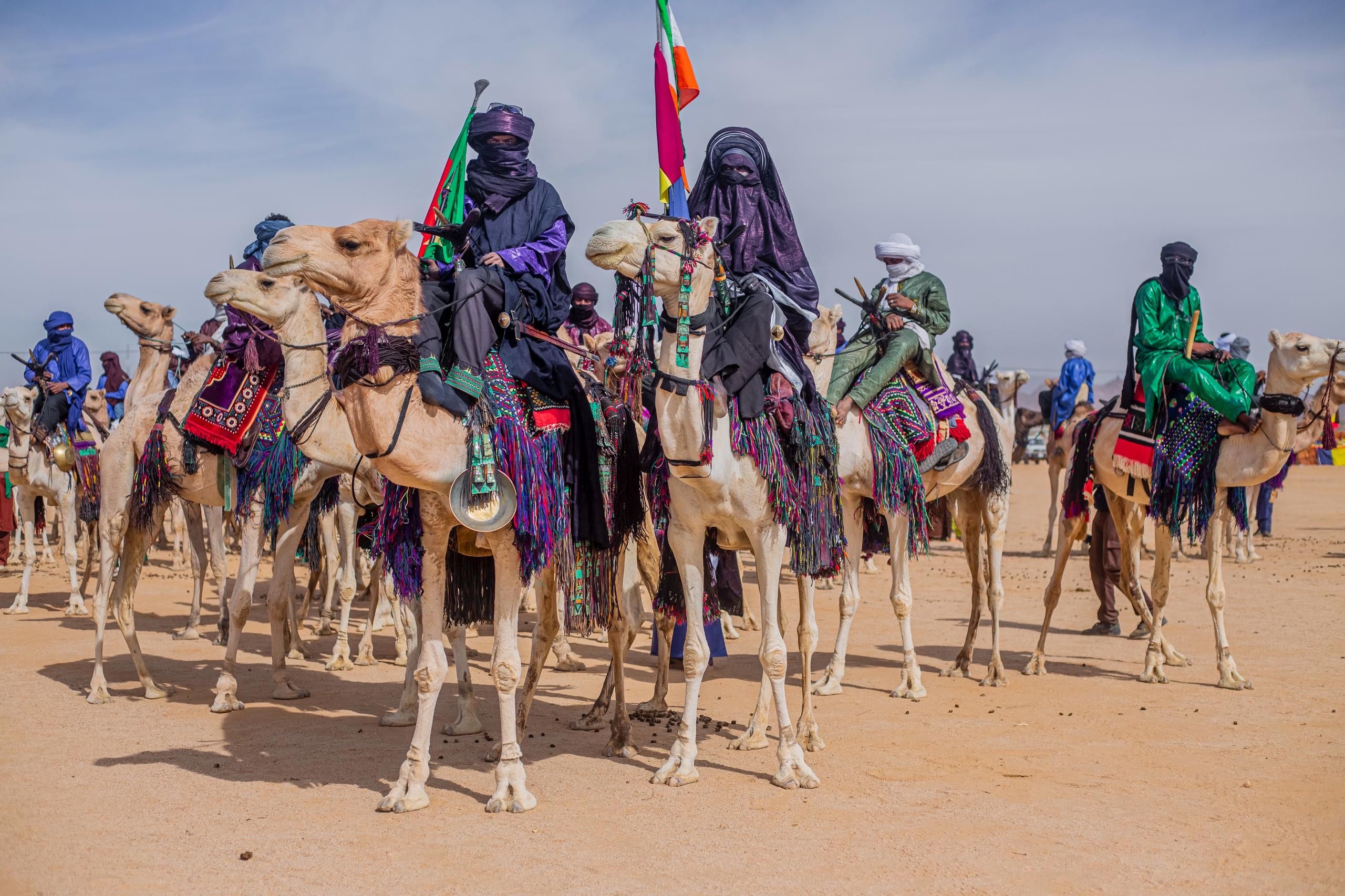 Traditional Tuareg Camel Cavalcade In Desert Free Stock Photo