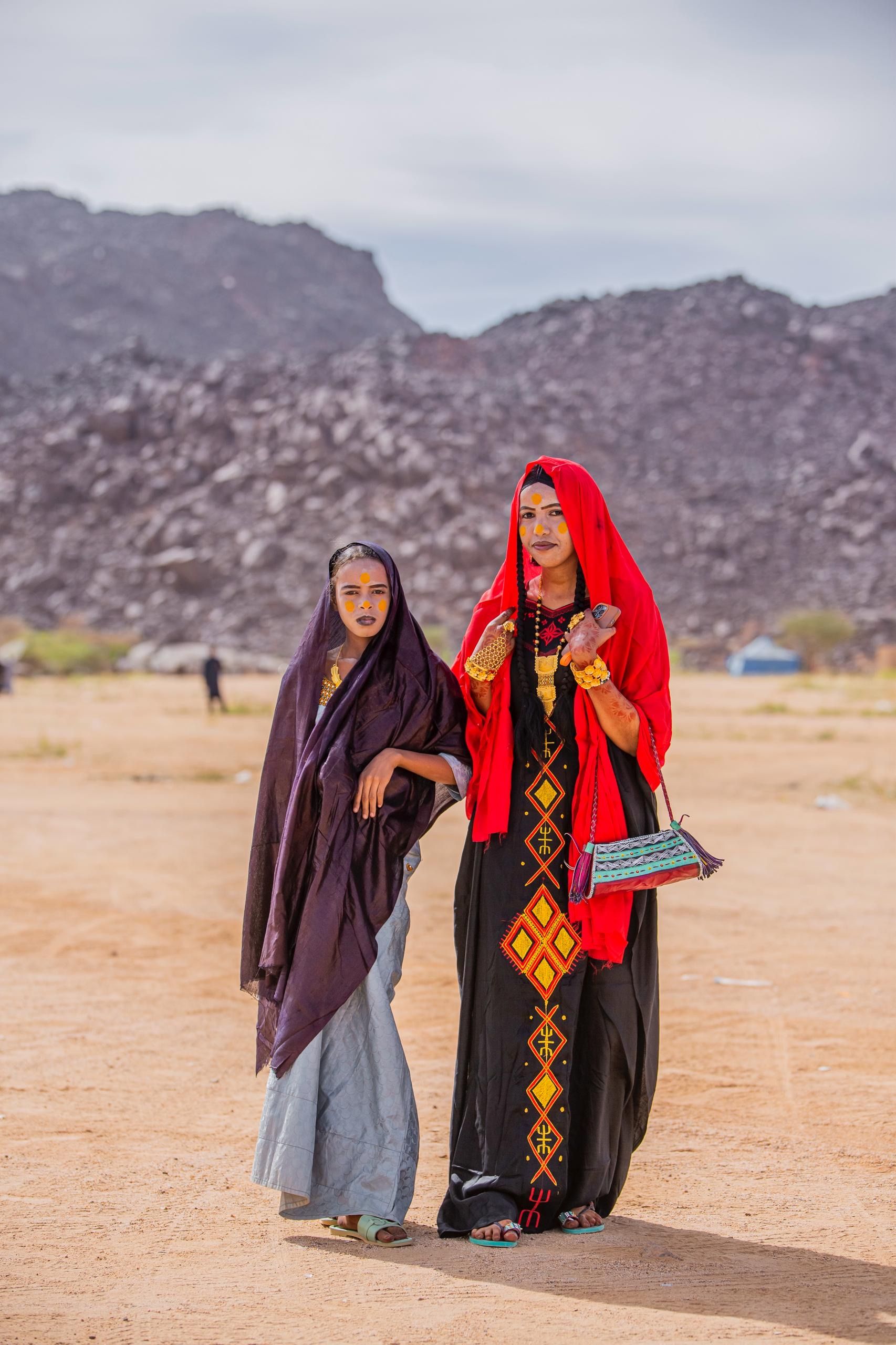 Traditional Attire in African Desert Landscape · Free Stock Photo