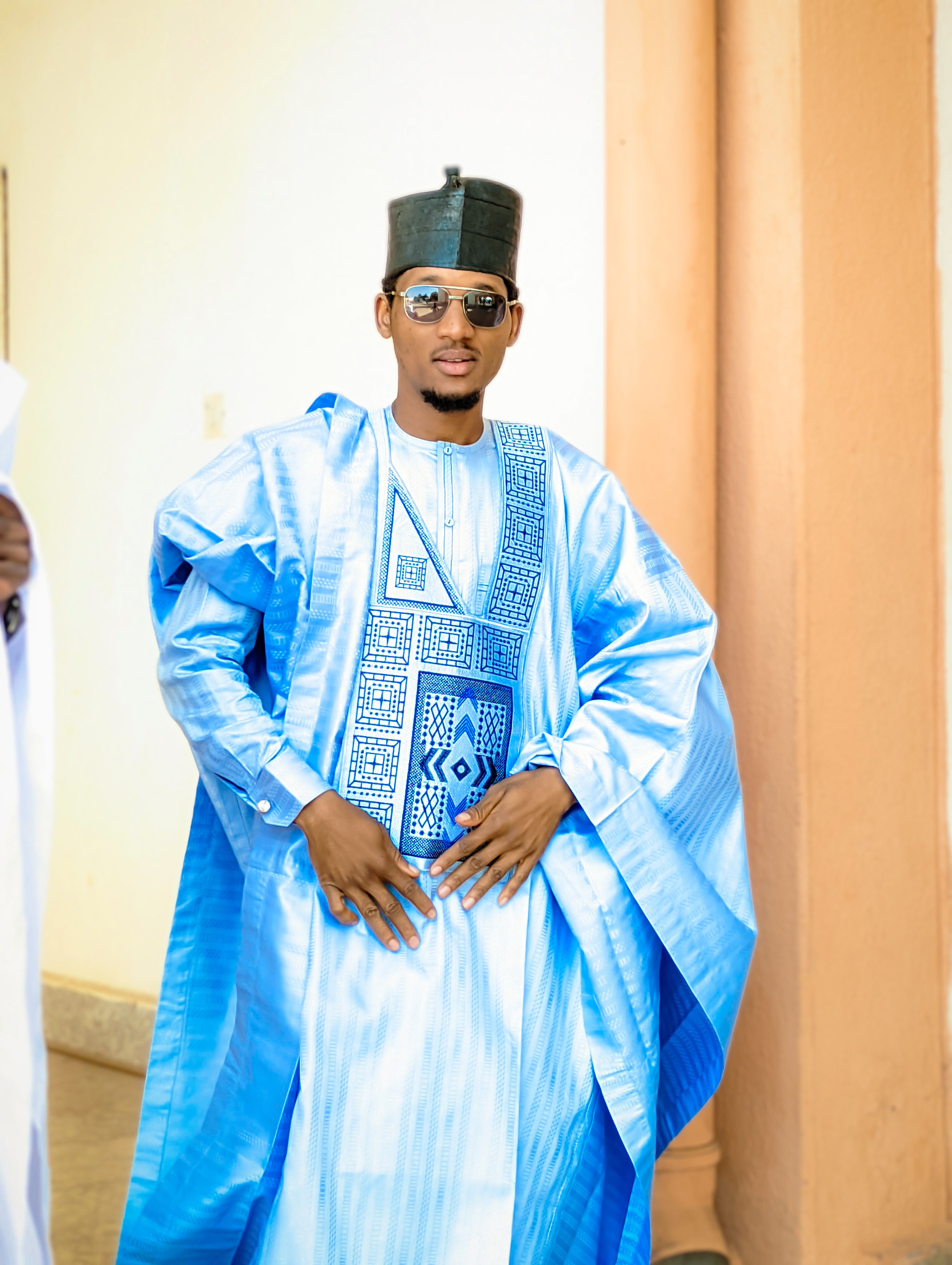 Hausa Man in Traditional Blue Attire · Free Stock Photo