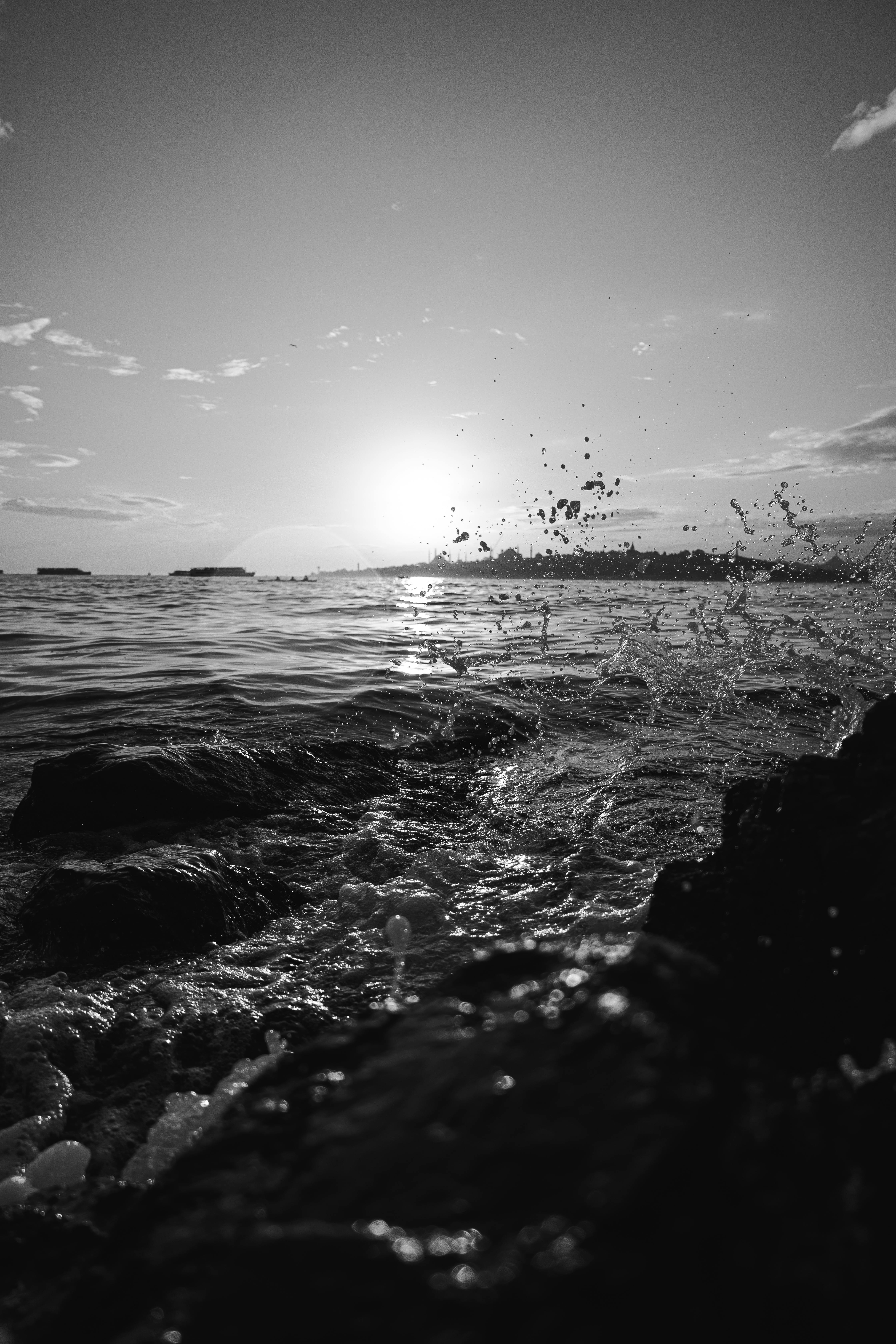 Black and White Ocean Waves at Sunset · Free Stock Photo