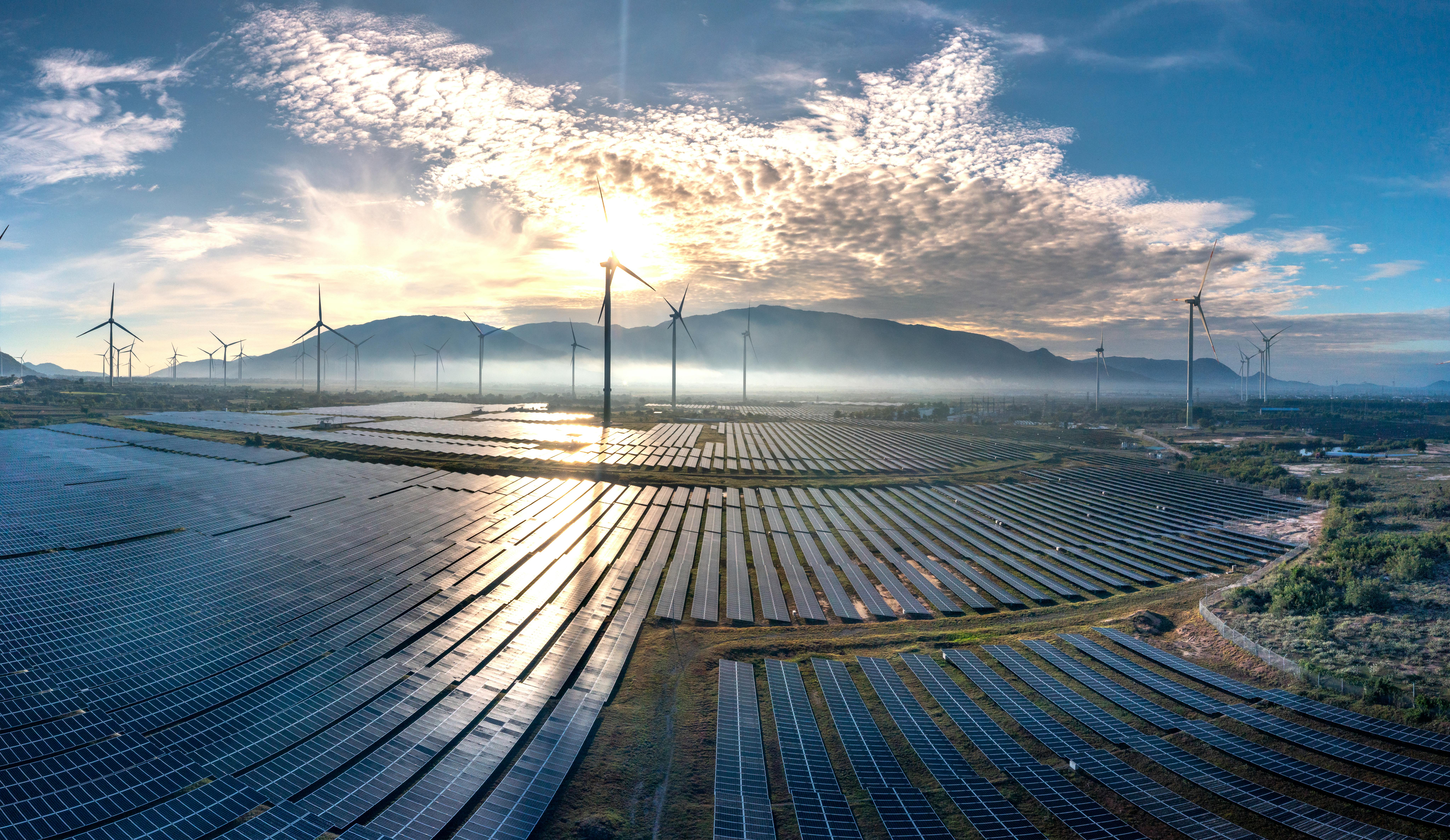 Aerial View of Renewable Energy Solar Farm at Sunrise · Free Stock Photo
