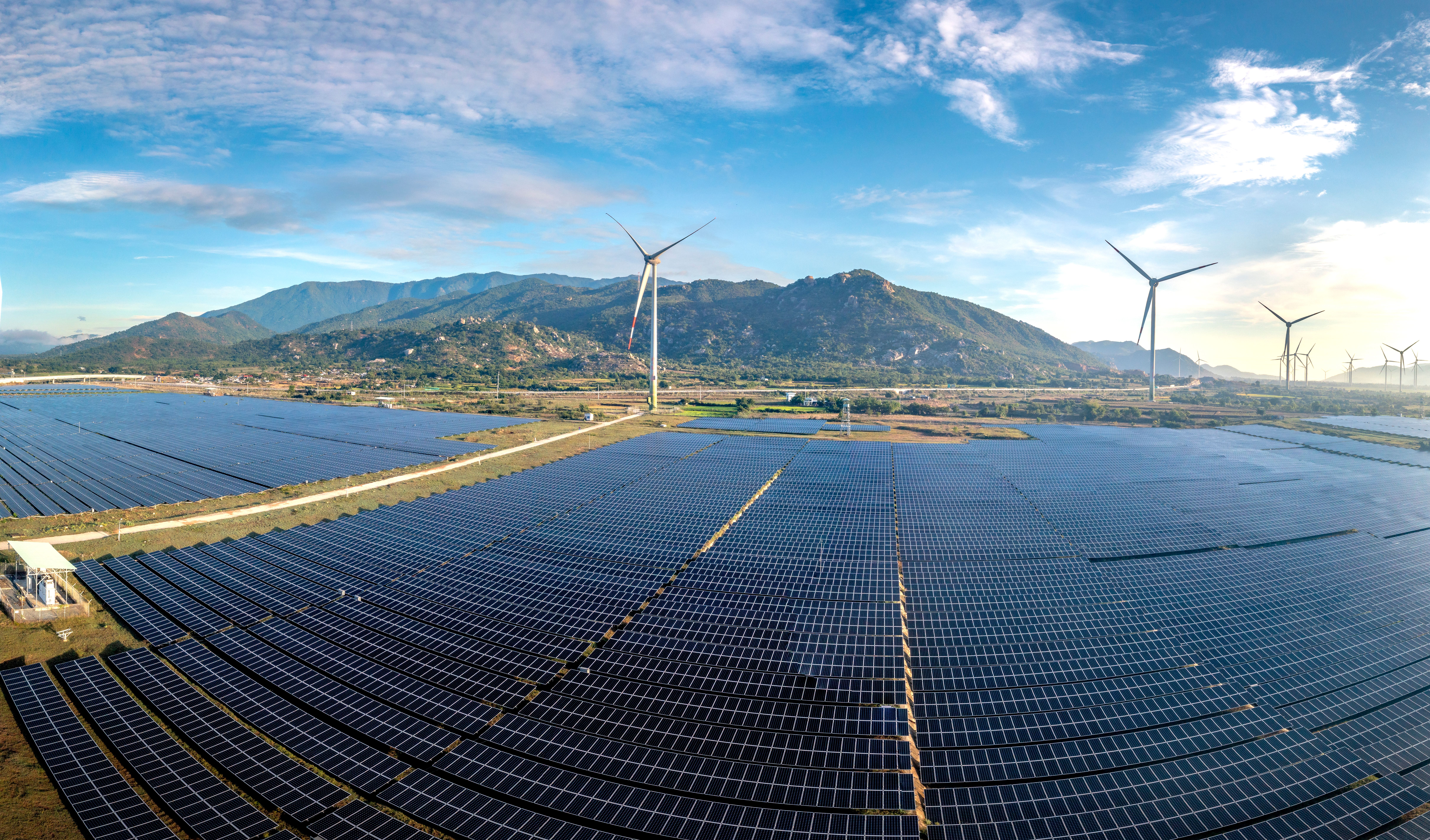 Aerial View of Solar Farm and Wind Turbines · Free Stock Photo