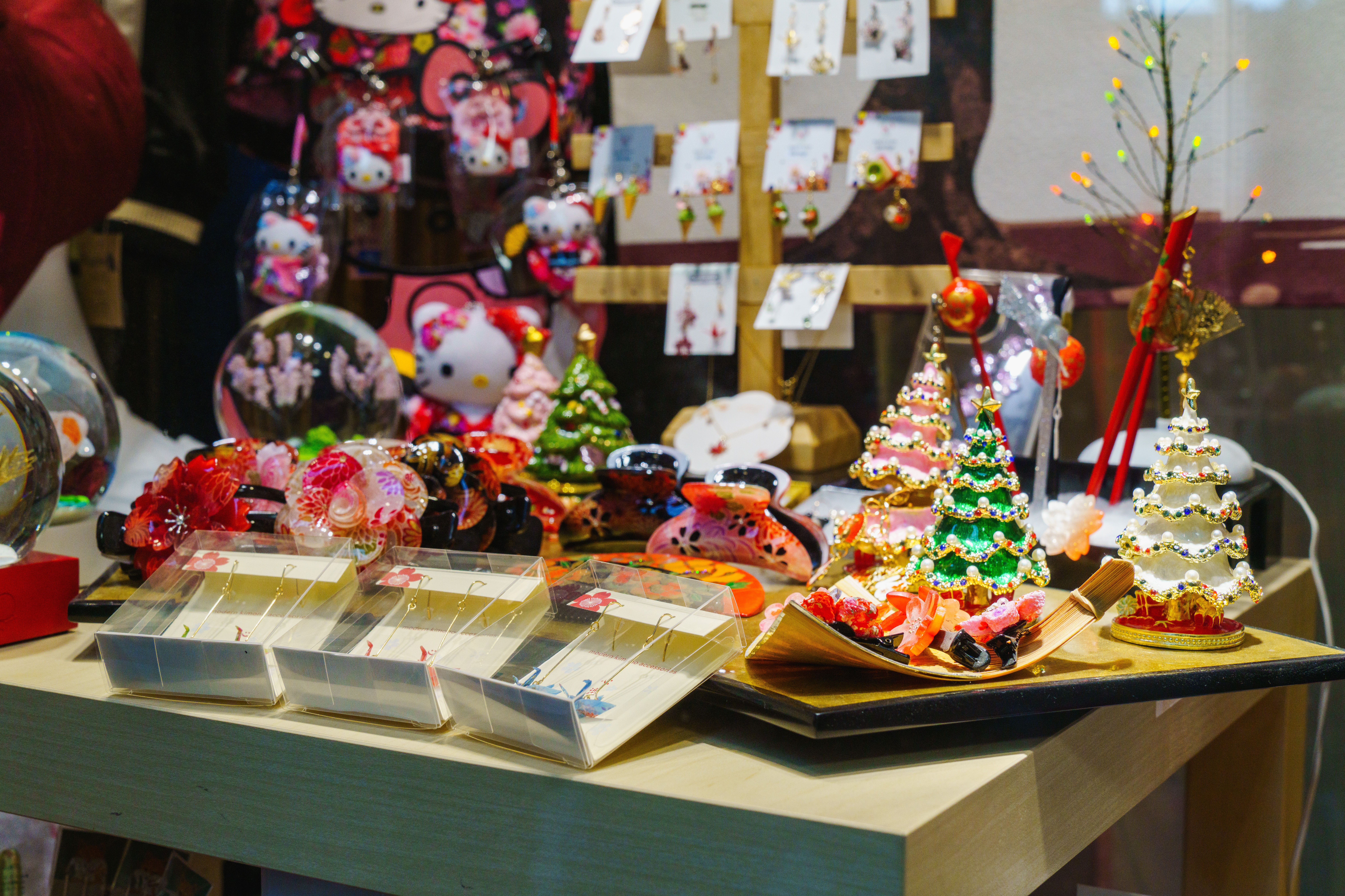 Festive Display of Christmas Ornaments in Shop · Free Stock Photo