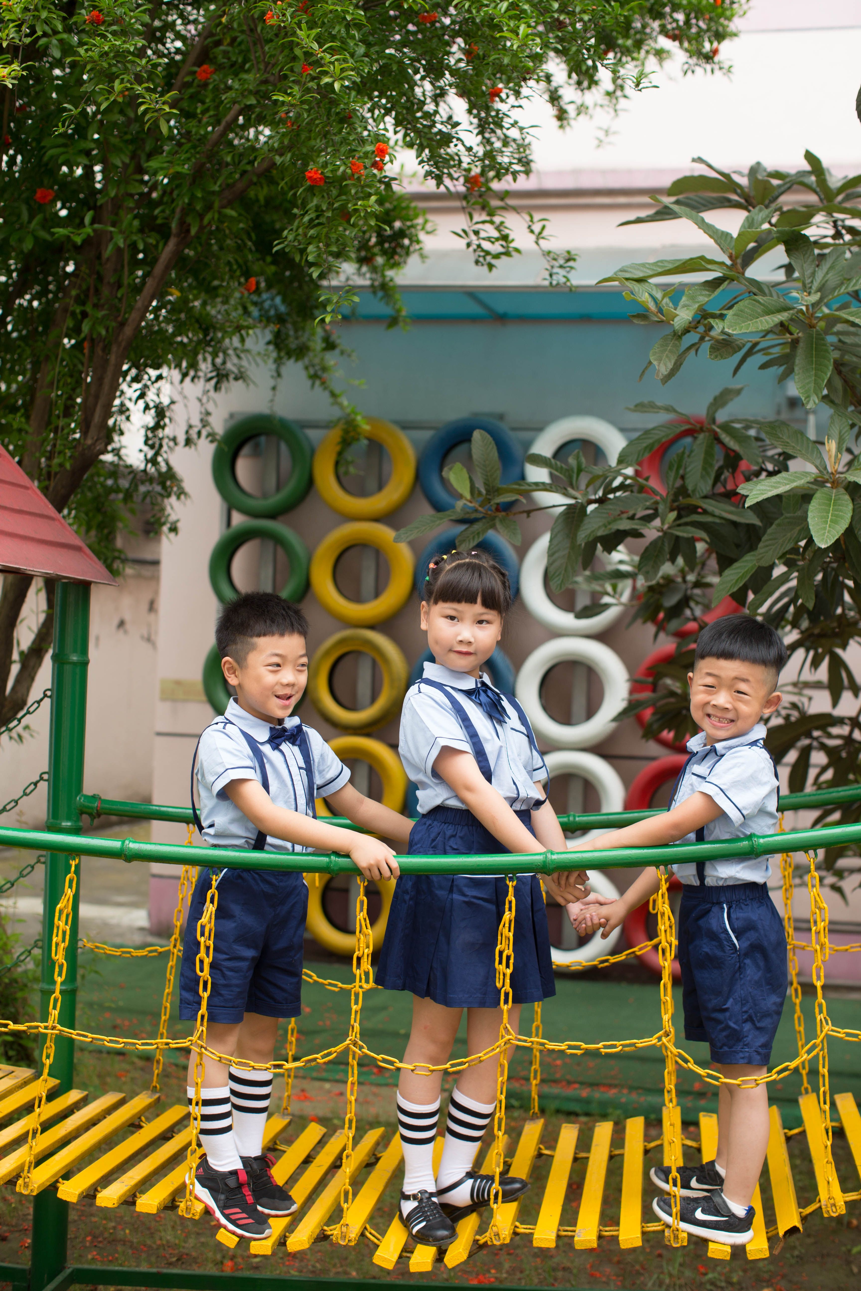 Happy Children Playing on School Playground · Free Stock Photo