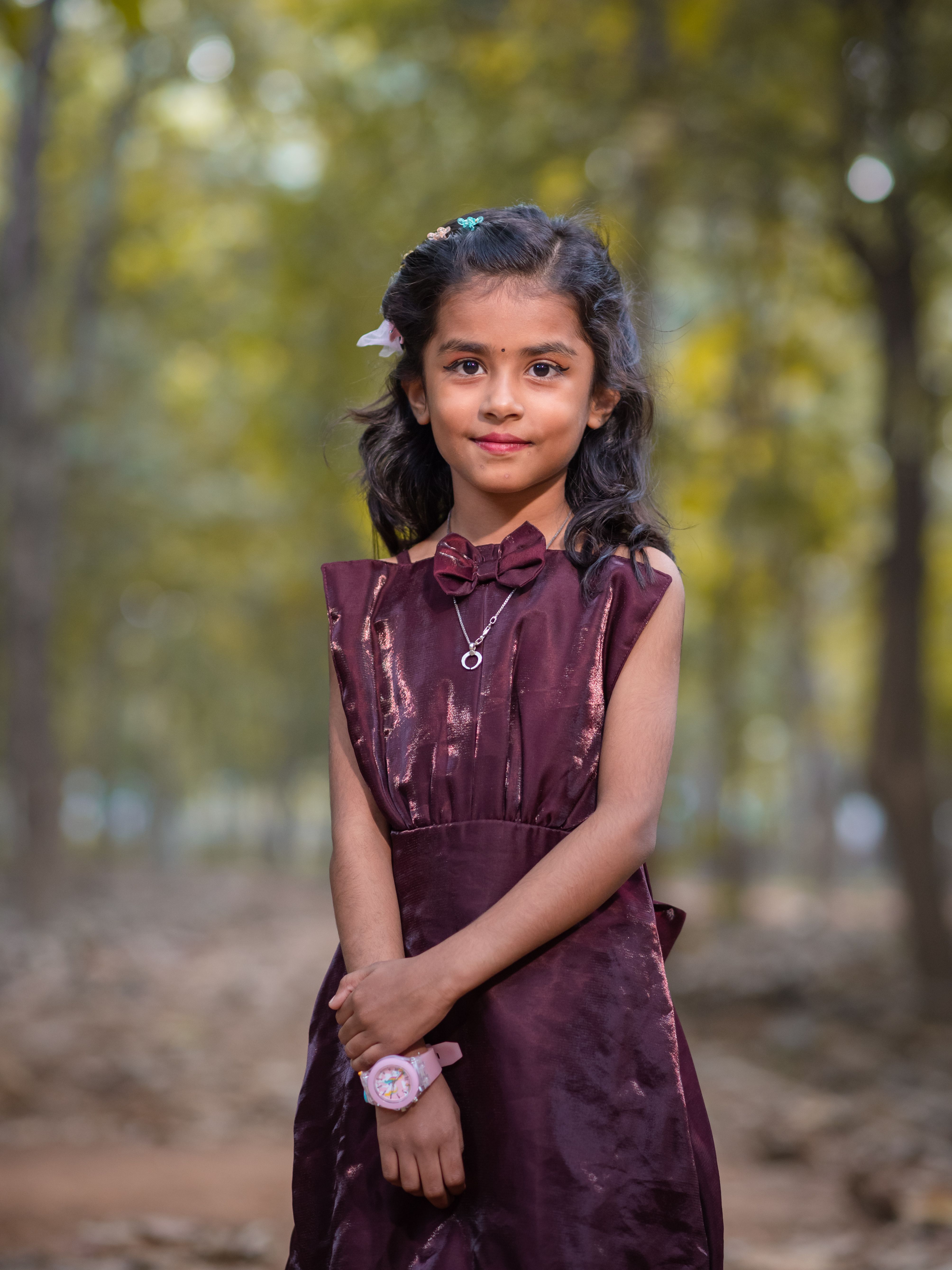 Charming Indian Girl in Maroon Dress in Forest · Free Stock Photo