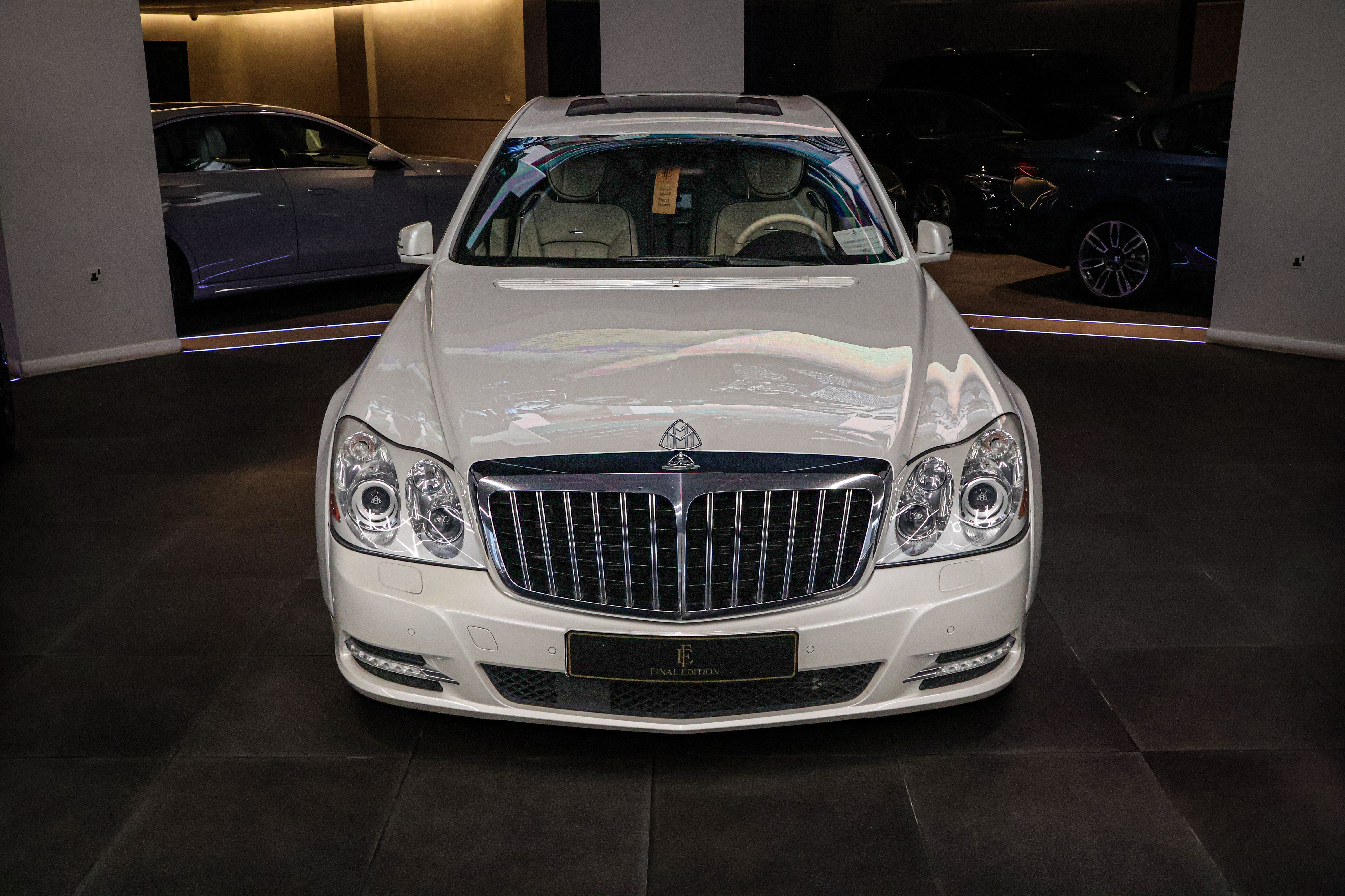 Luxury Car Showcase in Elegant Showroom · Free Stock Photo