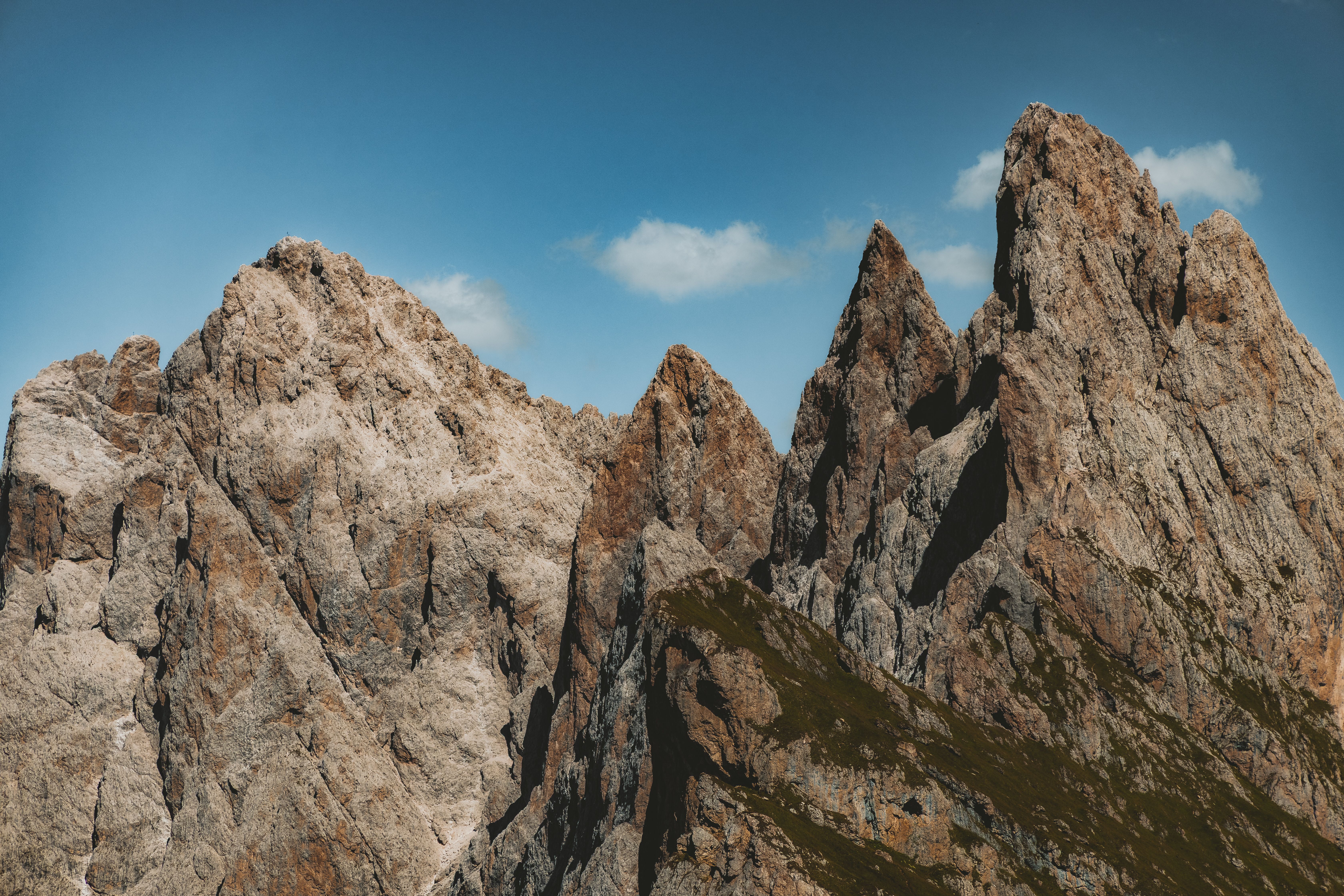 Dramatic Mountain Peaks Under Clear Blue Sky · Free Stock Photo