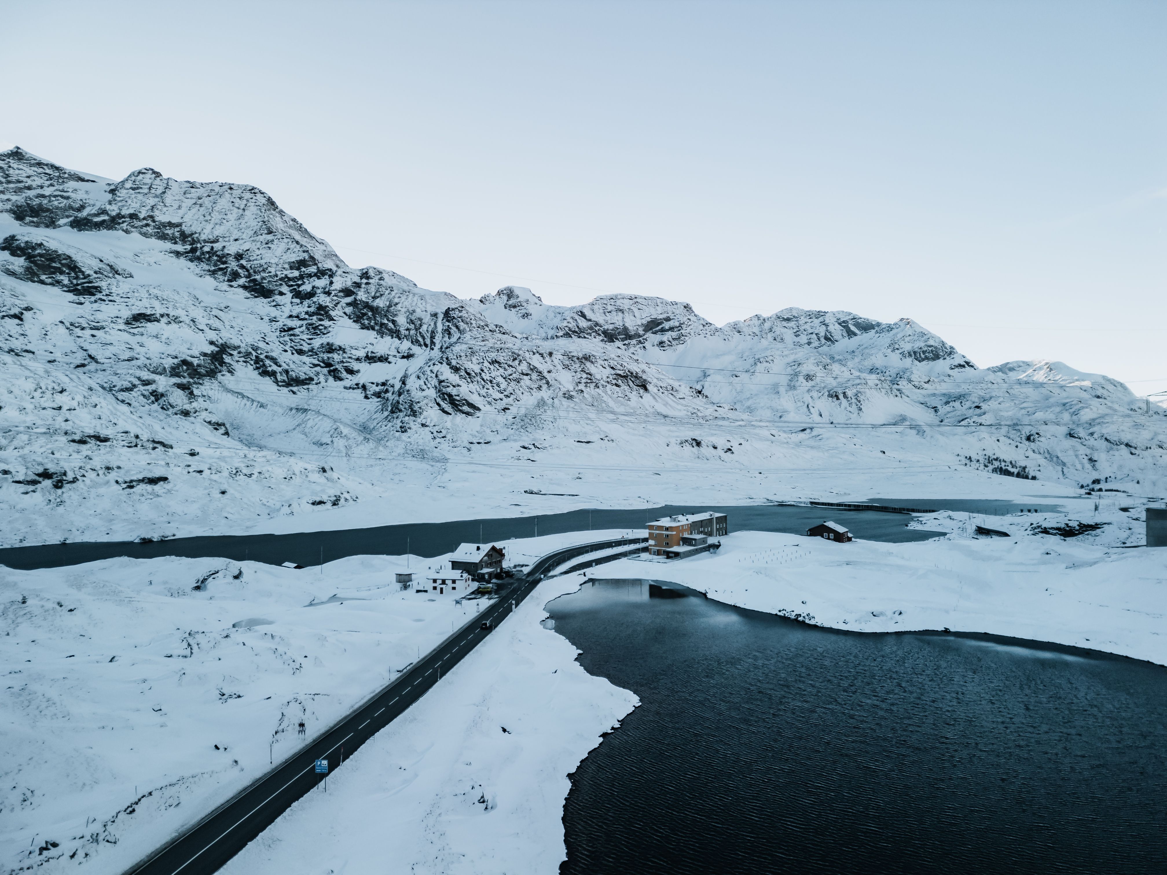 Snowy Alpine Landscape with Frozen Lake · Free Stock Photo
