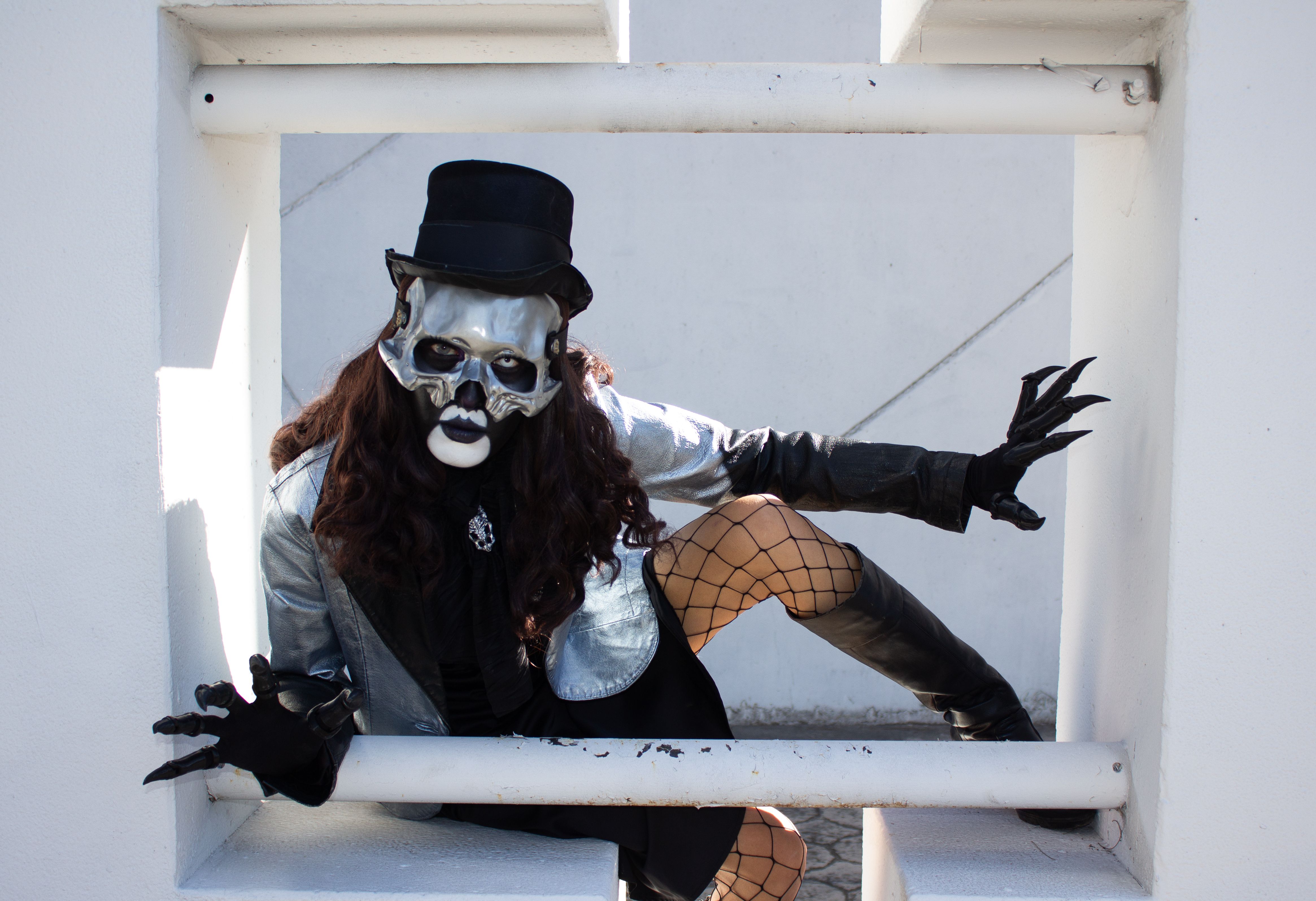 Masked Performer in Dramatic Costume Outdoors · Free Stock Photo