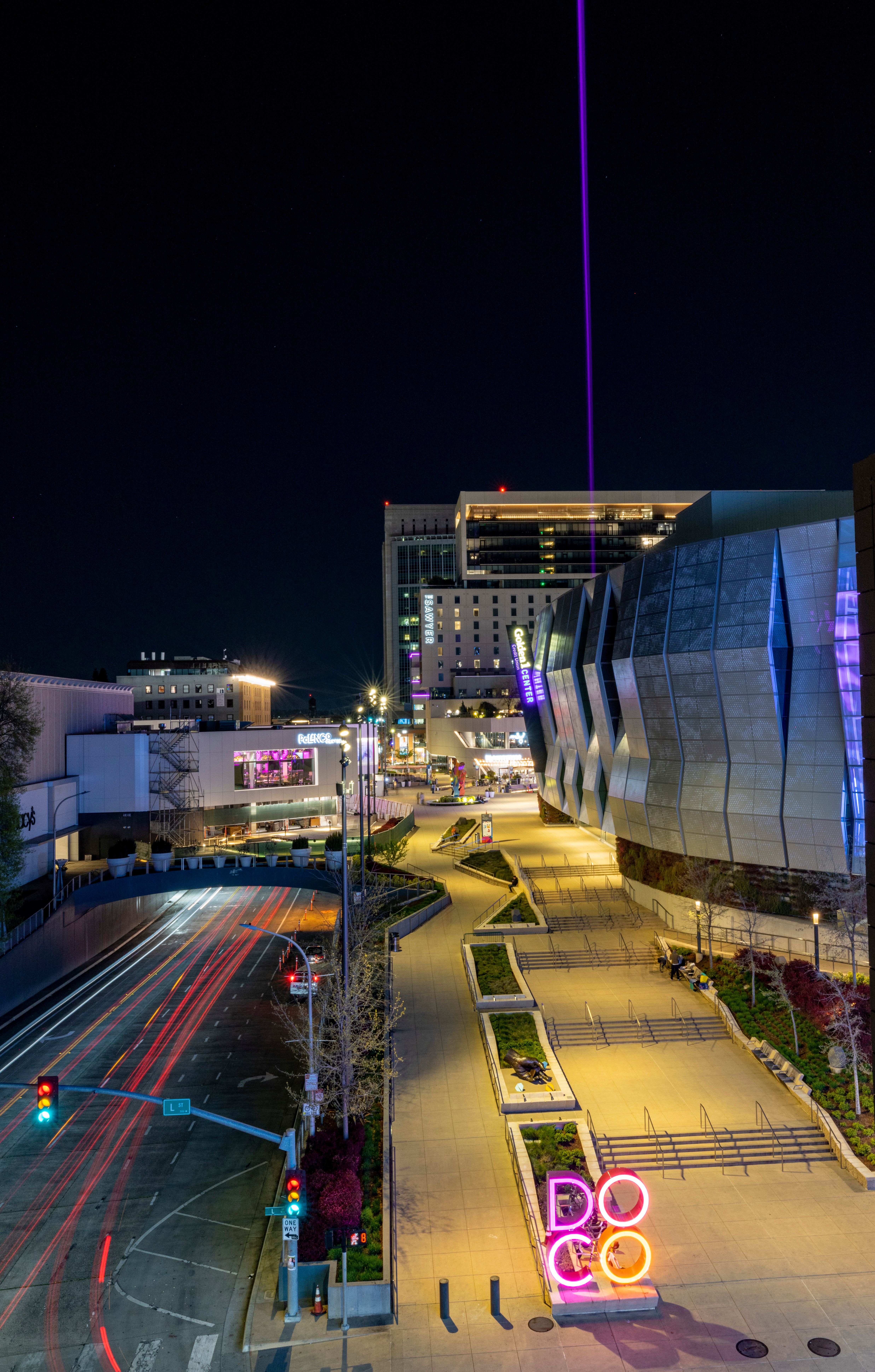 Vibrant Nighttime Cityscape with DOCO Sign · Free Stock Photo