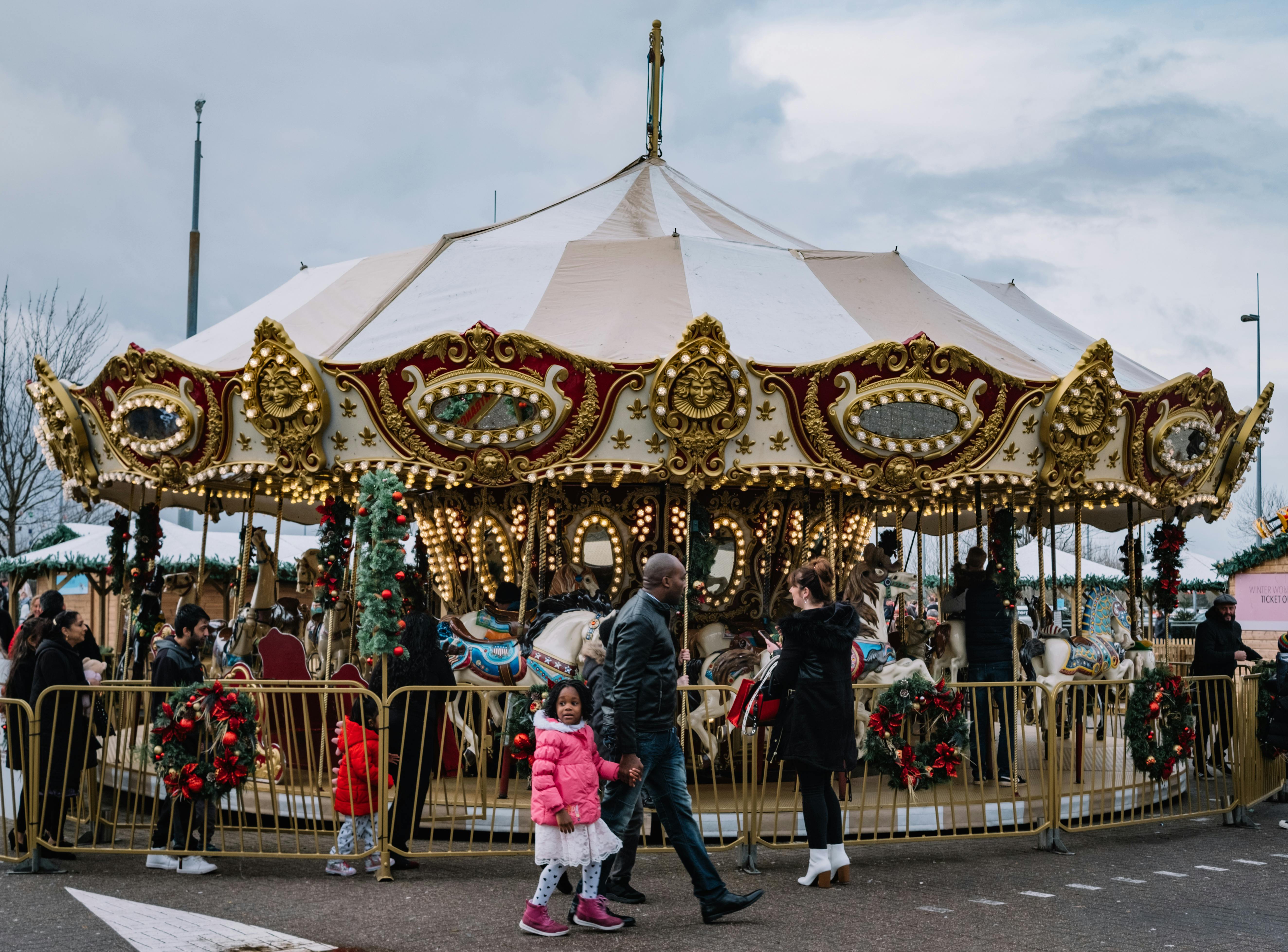 People around carousel in amusement park · Free Stock Photo