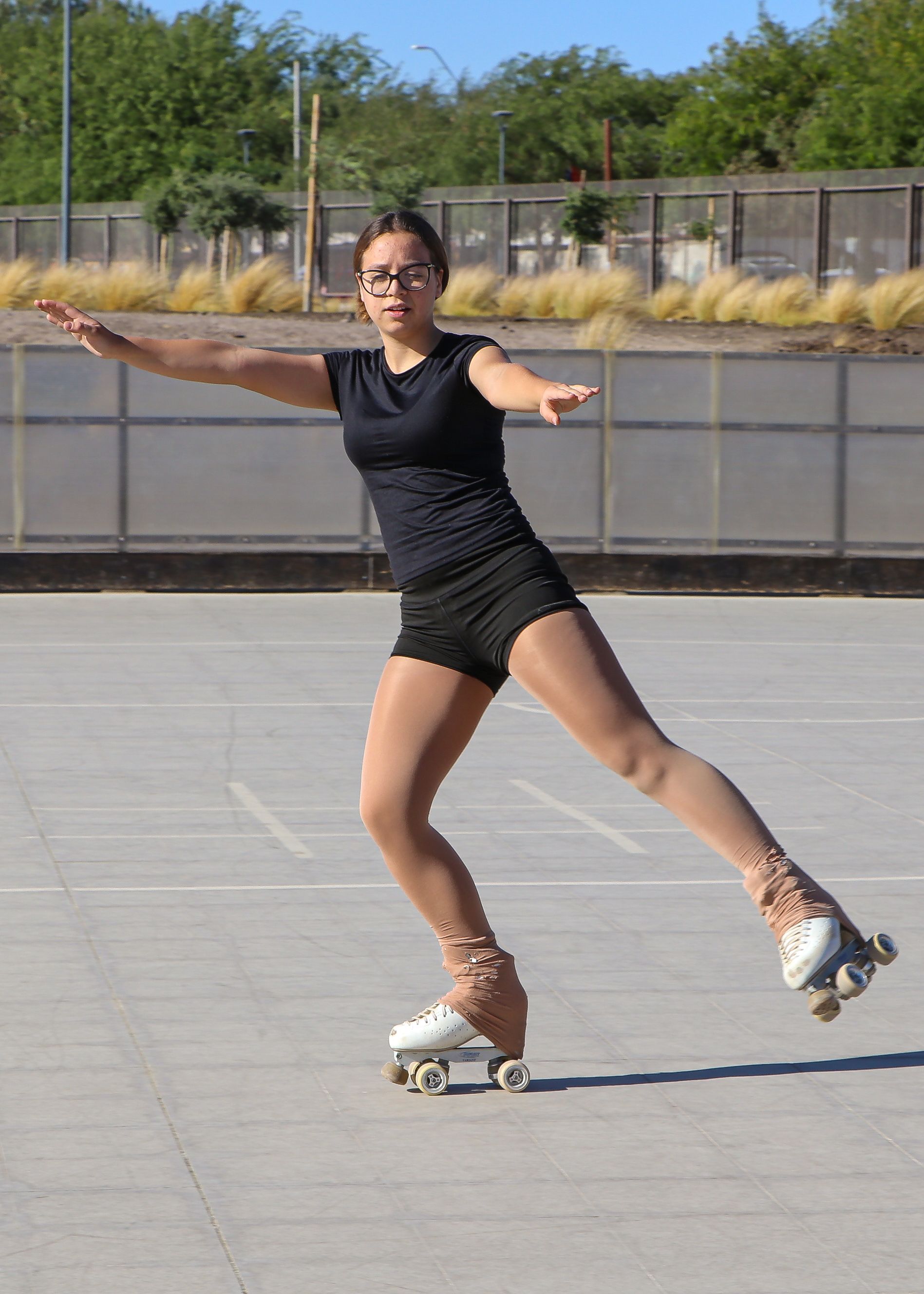 Young Woman Roller Skating Outdoors in Chile · Free Stock Photo