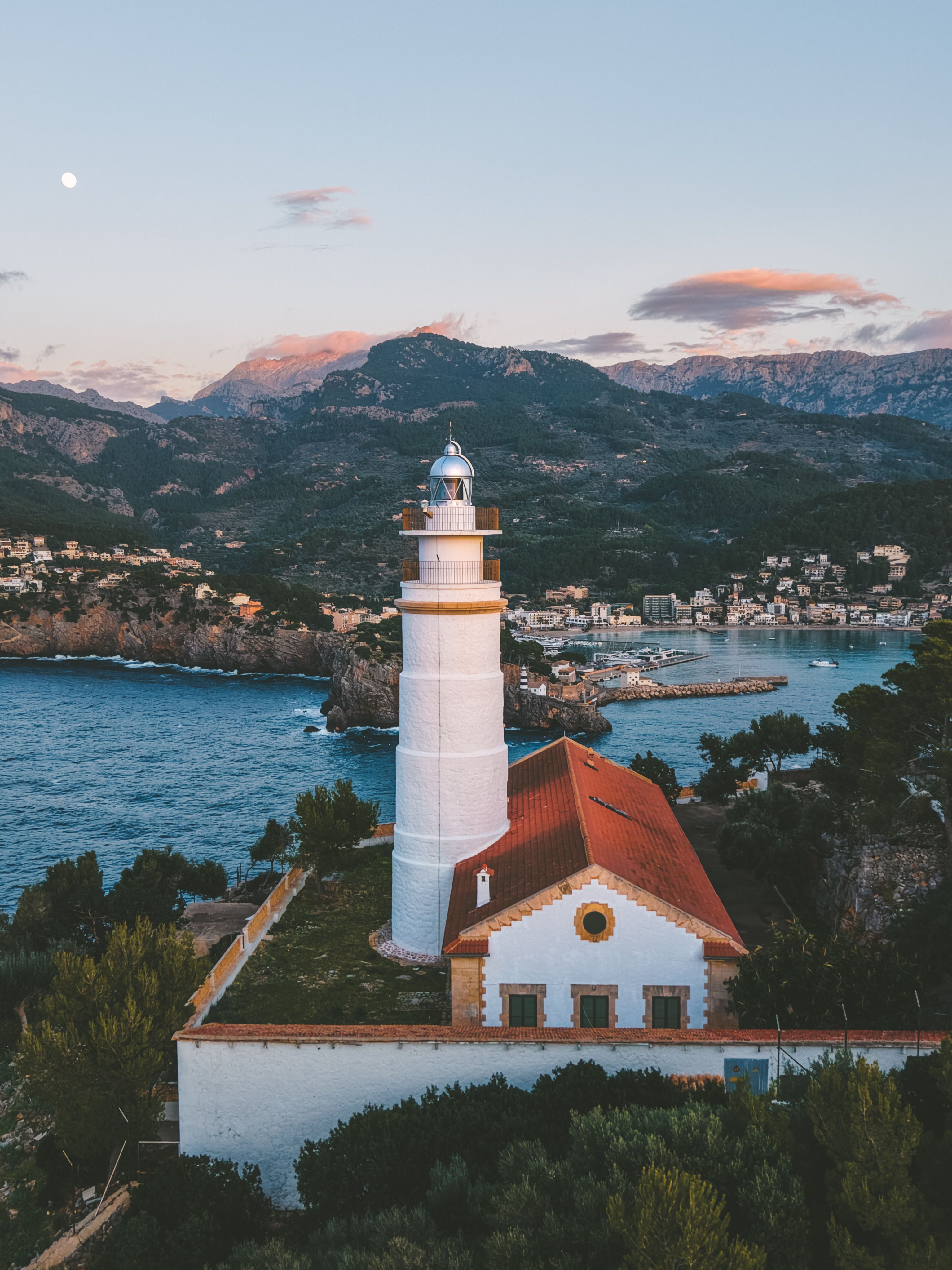 Scenic Lighthouse Overlooking Mediterranean Shoreline · Free Stock Photo