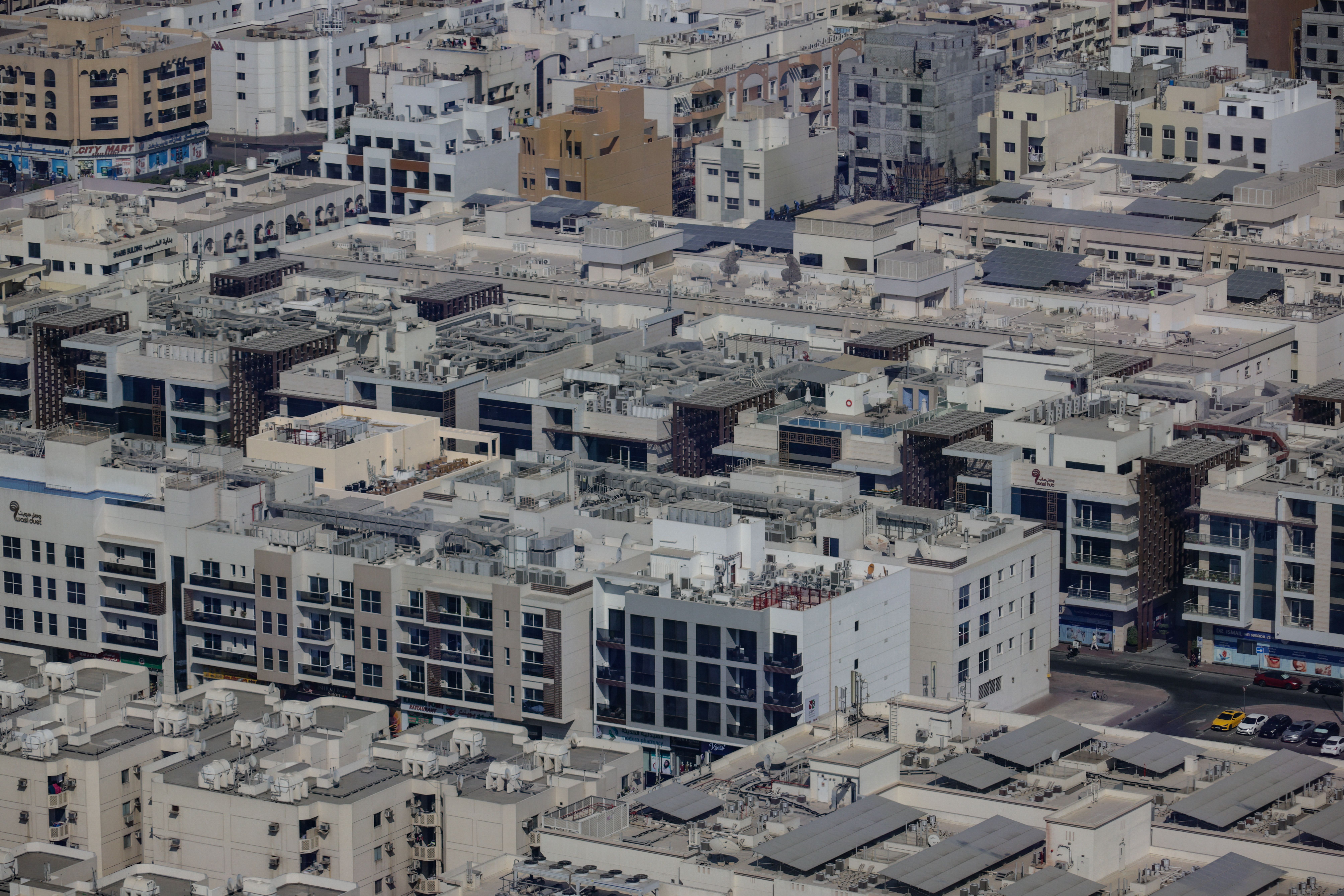 Aerial View of Dense Urban Architecture in Dubai · Free Stock Photo