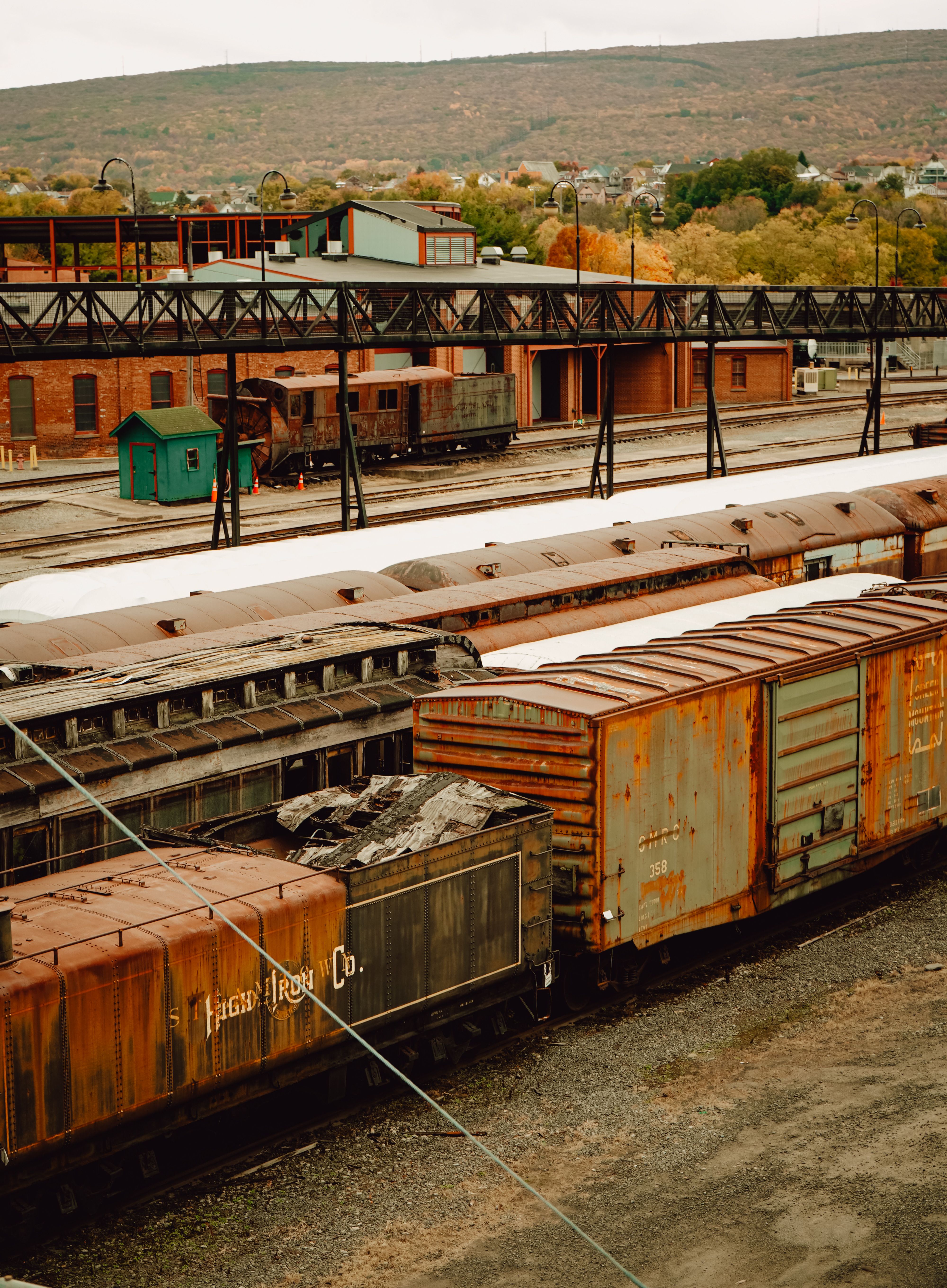 Rustic Industrial Train Yard with Boxcars · Free Stock Photo