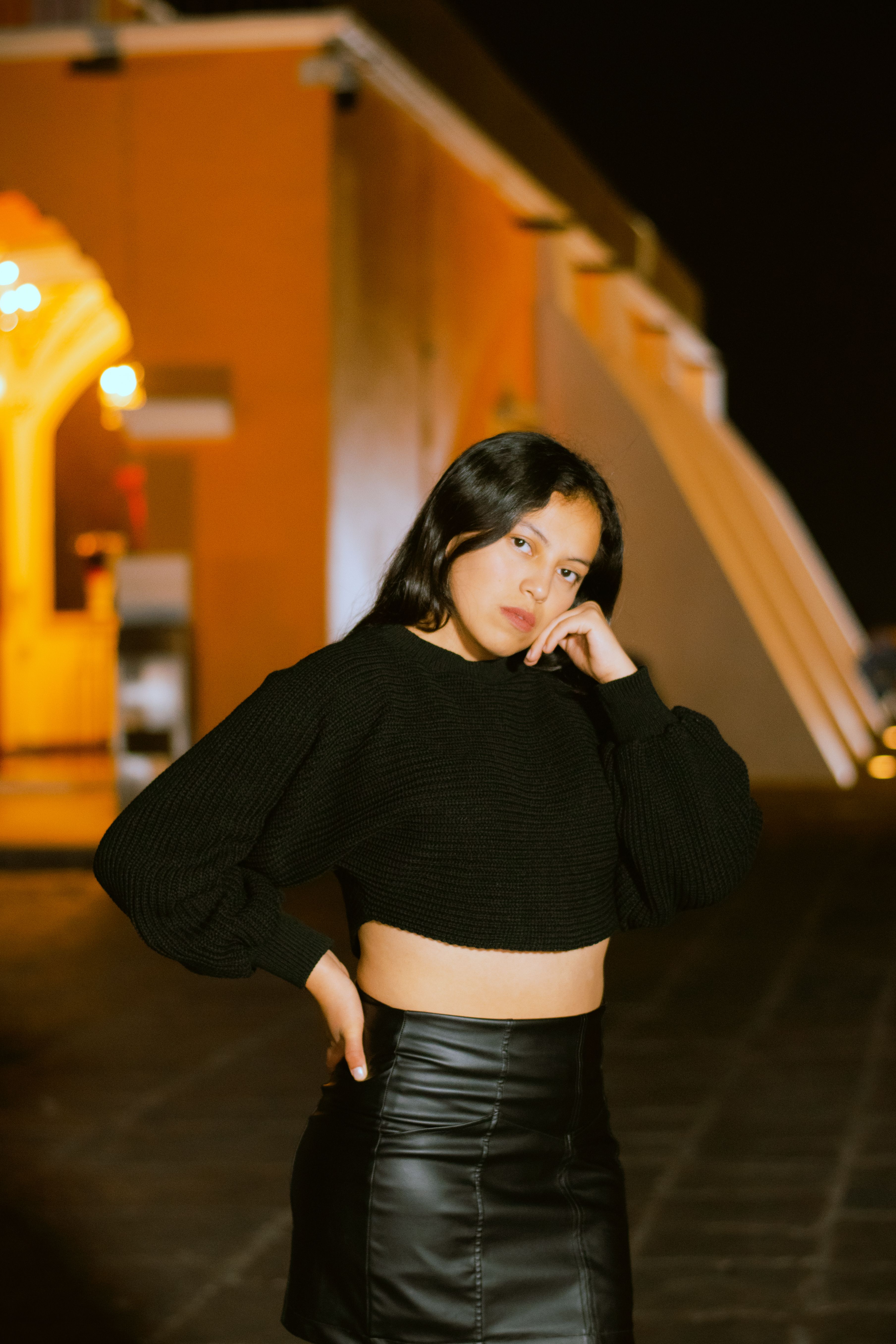 Stylish Woman Posing Indoors at Night · Free Stock Photo