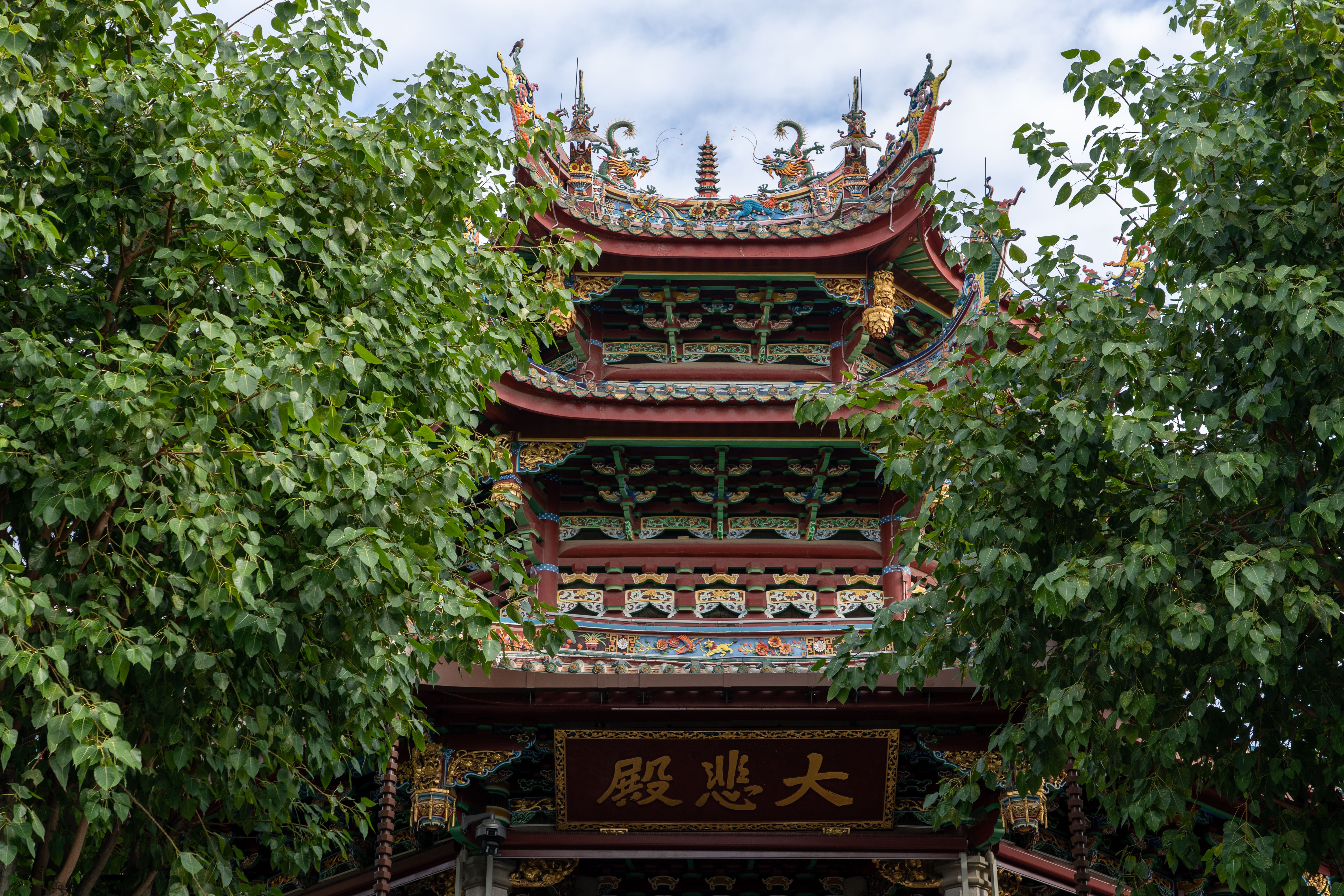 Ornate Traditional Asian Temple Roof Structure · Free Stock Photo