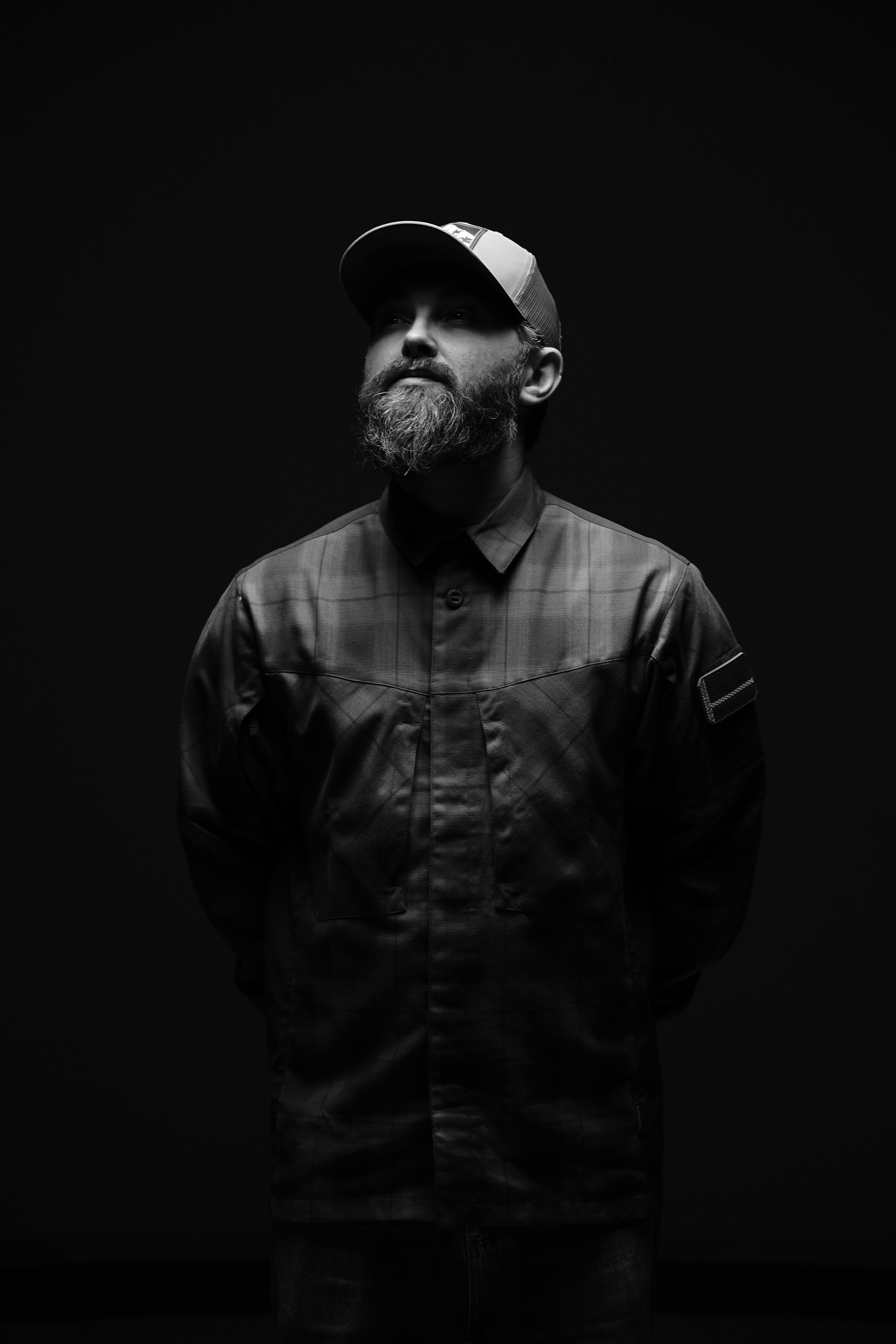 Moody Portrait of Bearded Man in Shadow · Free Stock Photo