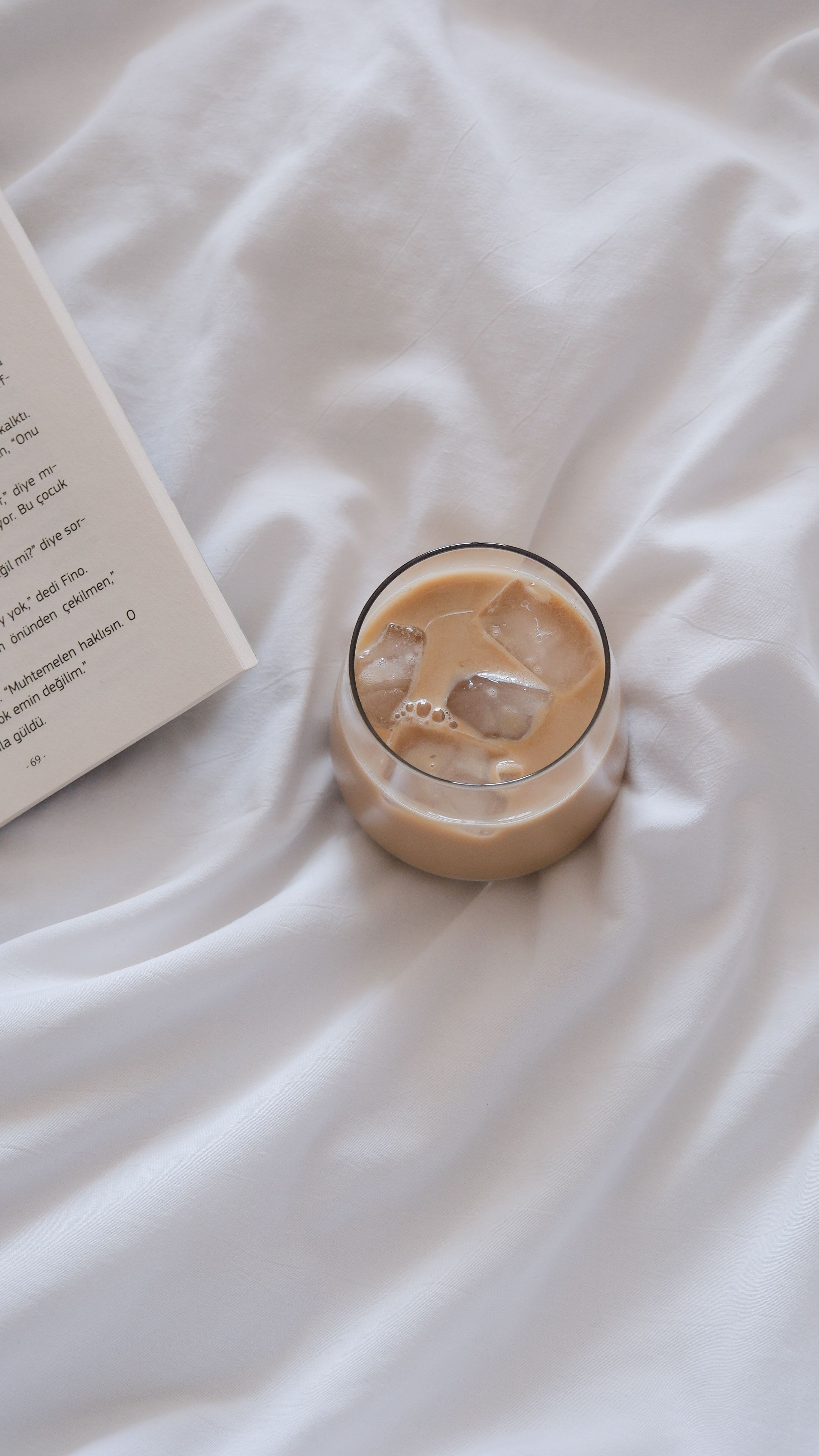 Cozy Morning with Iced Coffee on Bed · Free Stock Photo