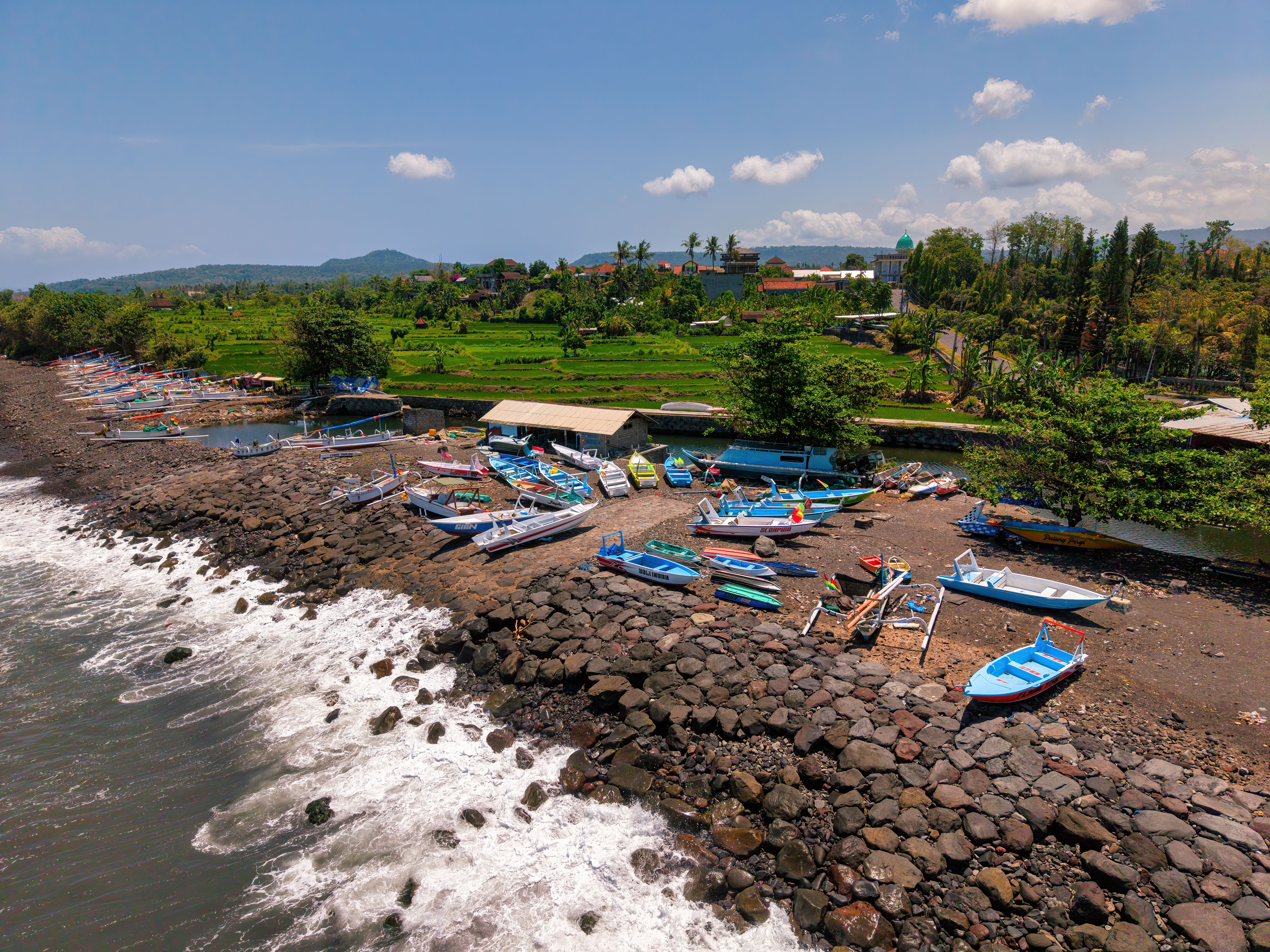 Aerial View of Vibrant Fishing Boats in Bali Harbor · Free Stock Photo