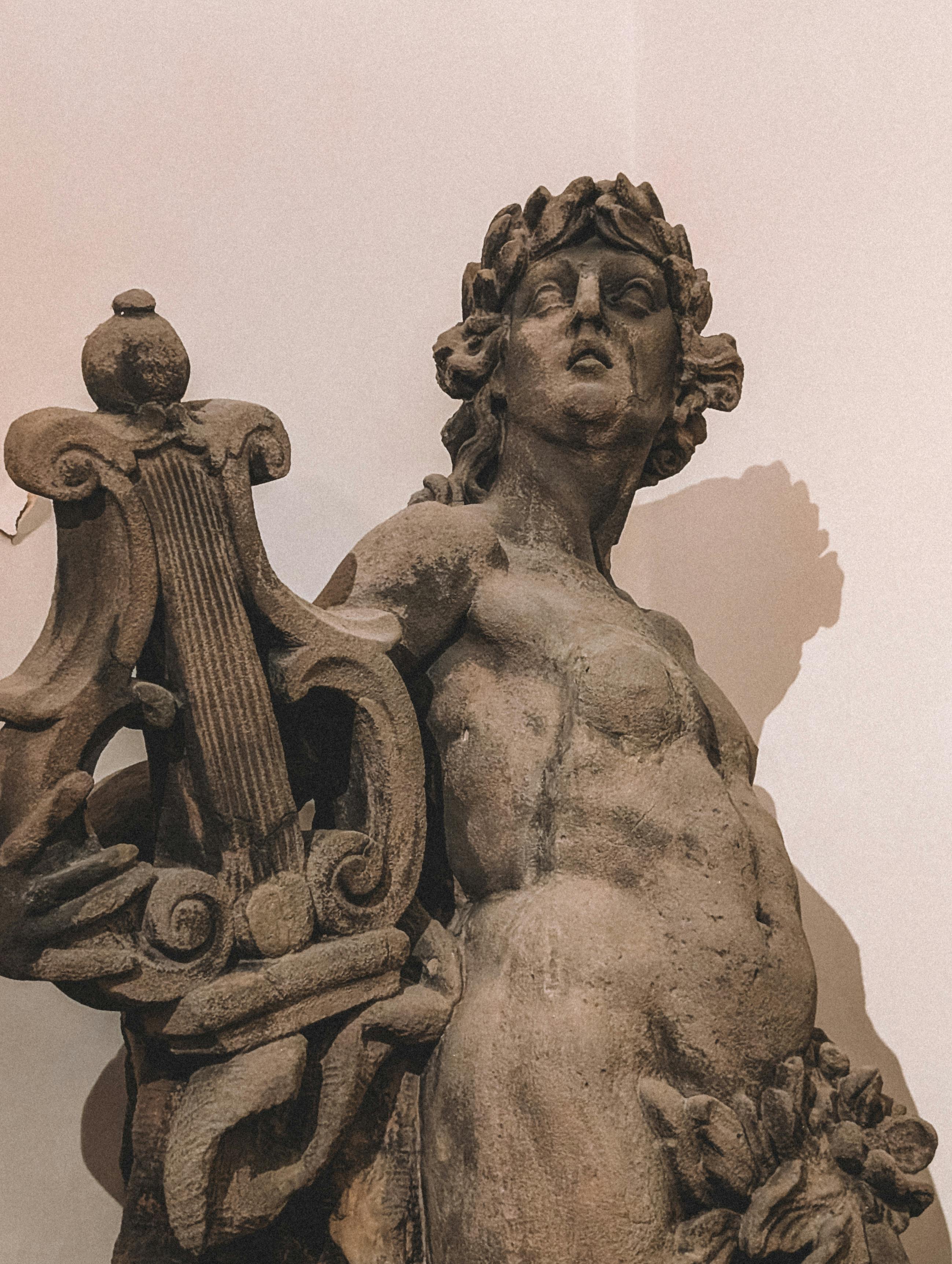 Ancient Stone Sculpture with Lyre in Bayreuth · Free Stock Photo