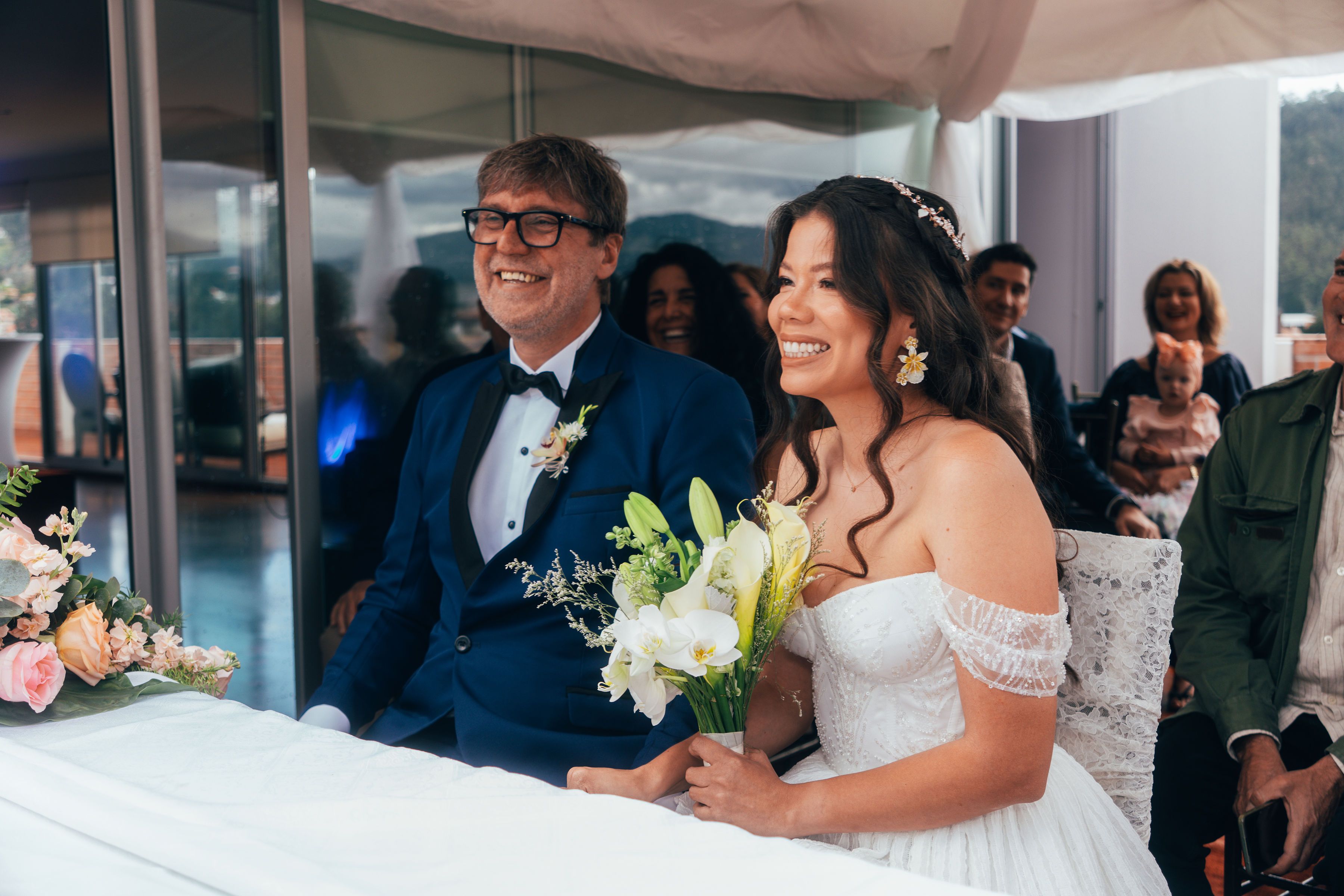 Joyful Wedding Ceremony with Smiling Couple · Free Stock Photo