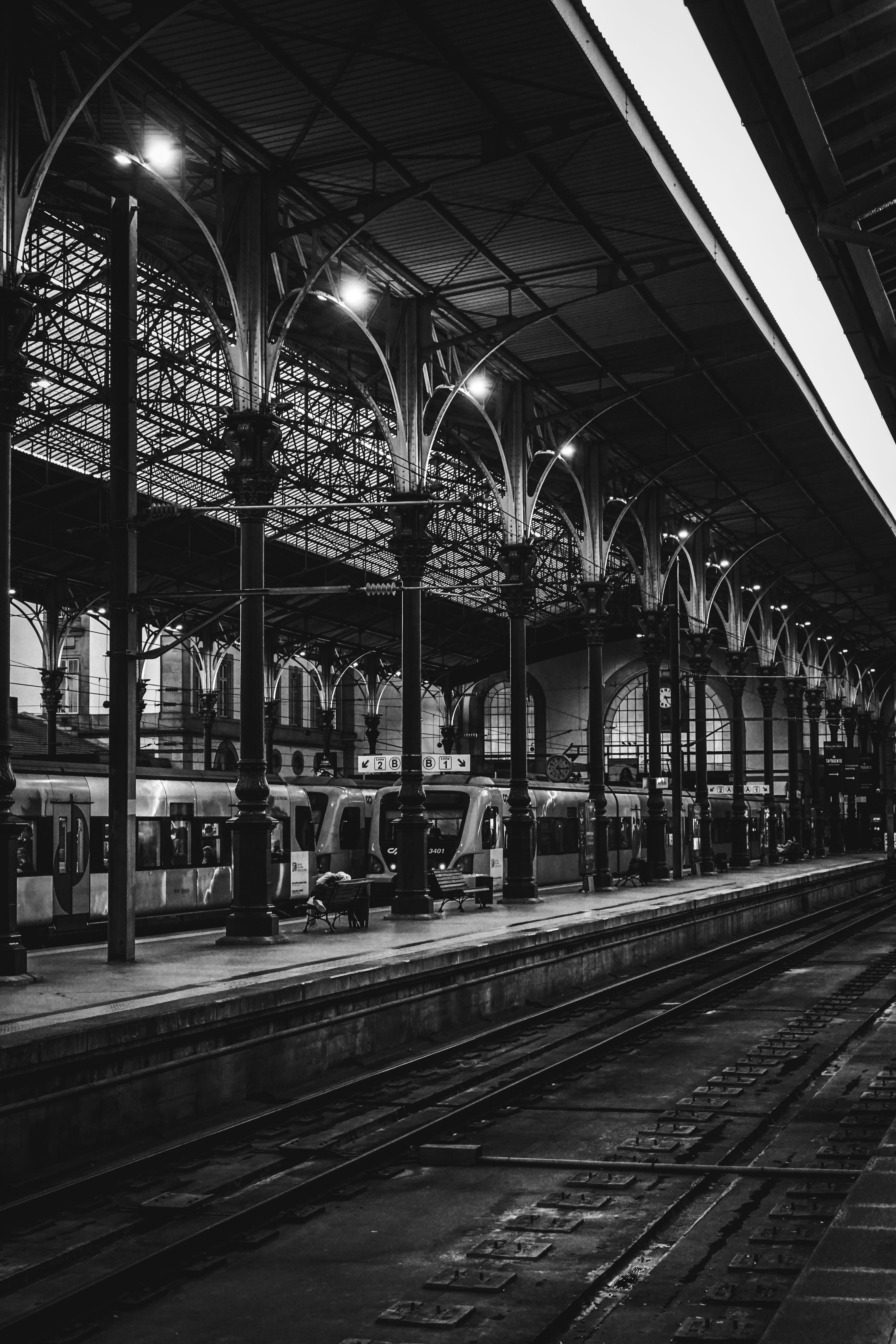 Black and White Urban Train Station Scene · Free Stock Photo