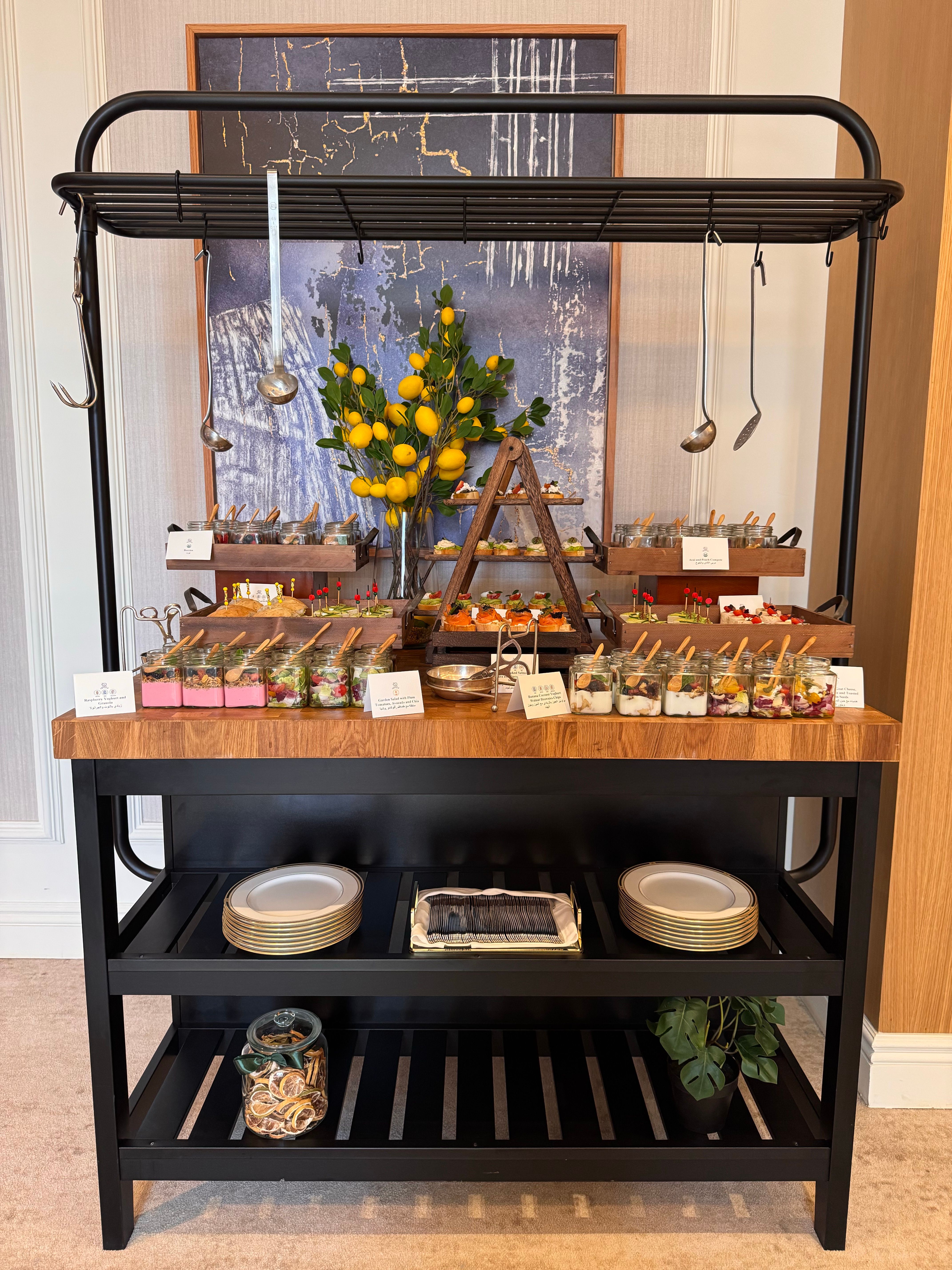 Elegant Buffet Display with Citrus Centerpiece · Free Stock Photo