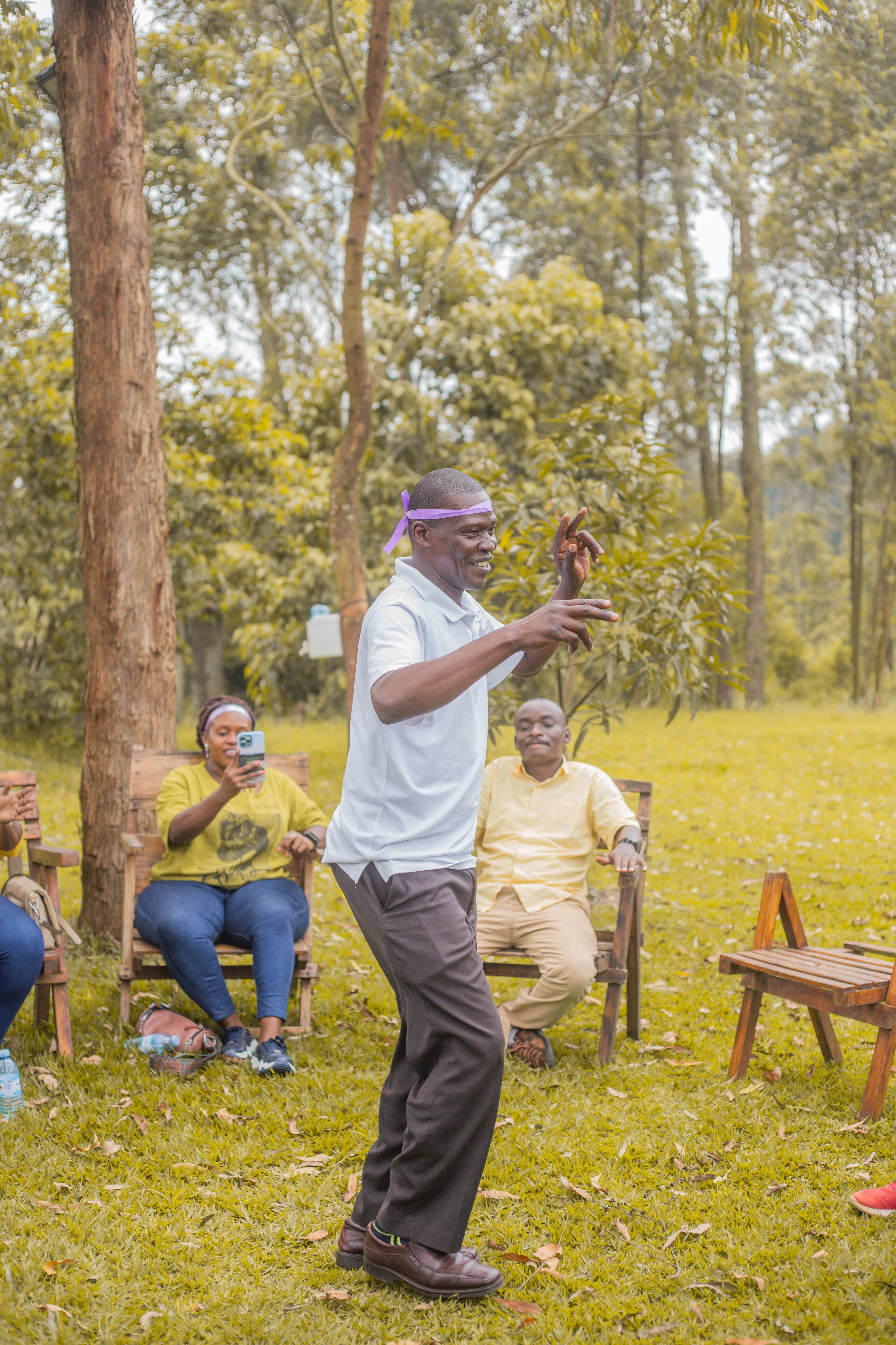Outdoor Gathering Capturing Joyful Dance Moment · Free Stock Photo